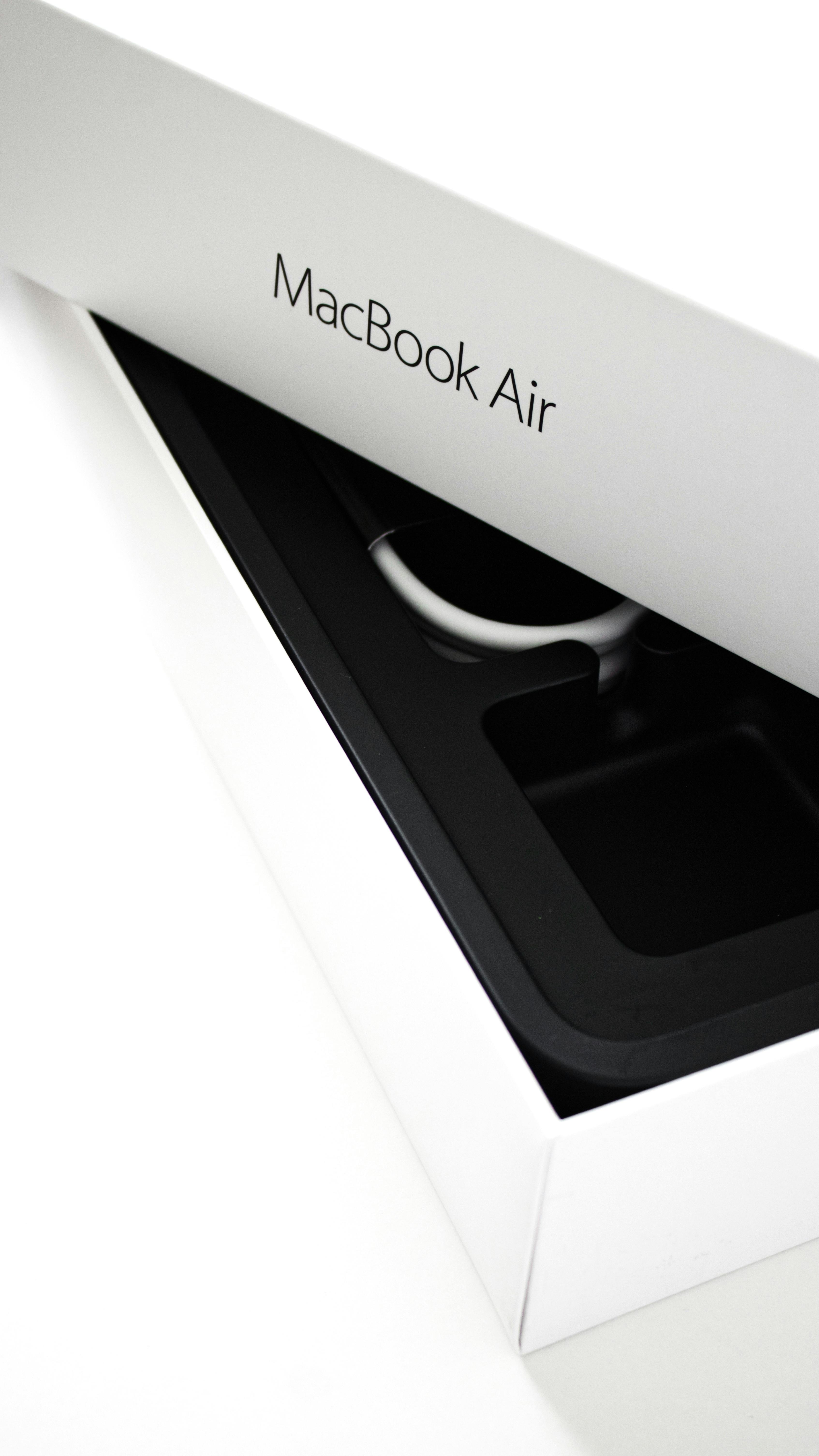 Macbook Air Box on White Table · Free Stock Photo