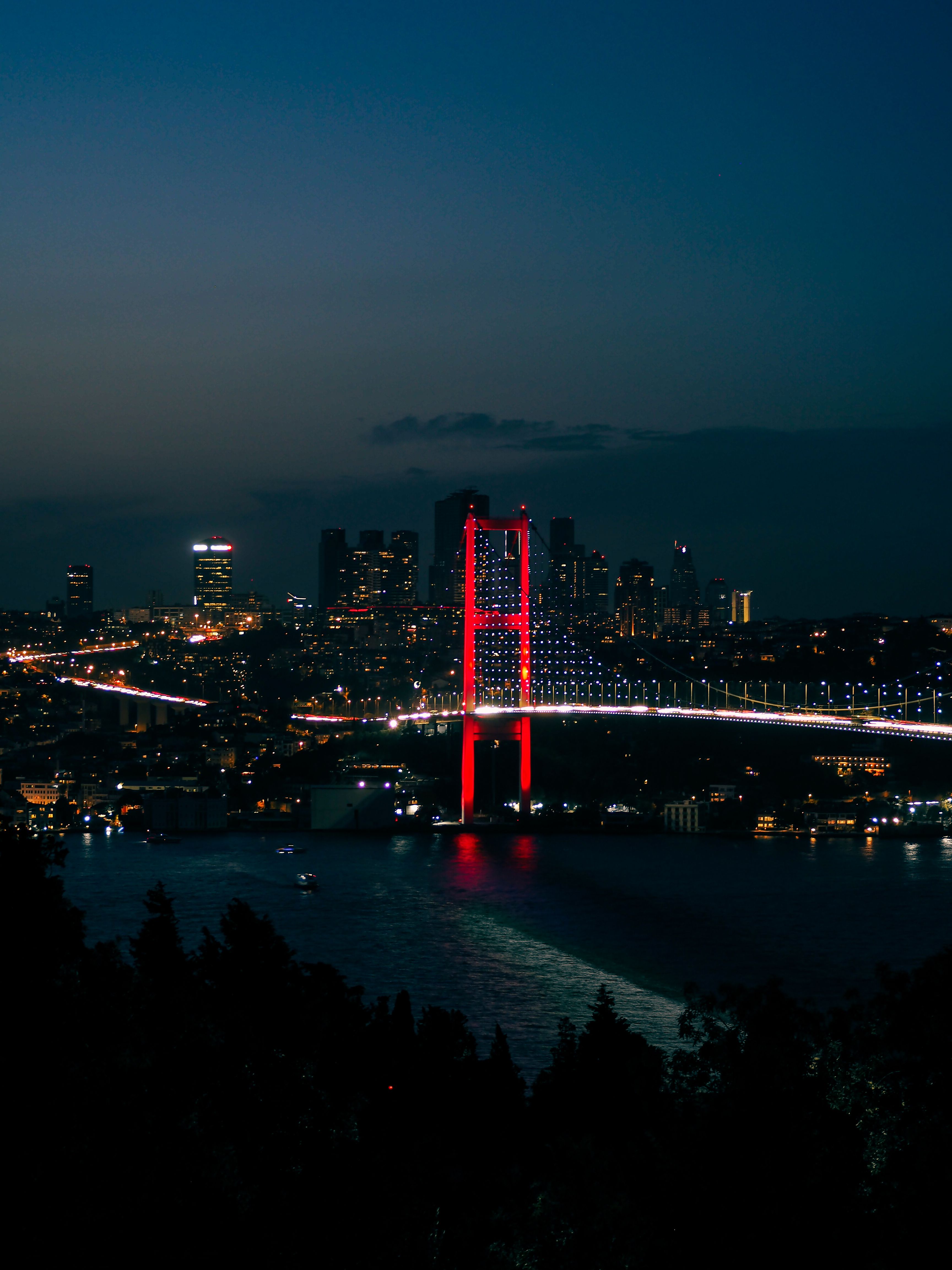 Red Bridge over Body of Water during Night Time · Free Stock Photo