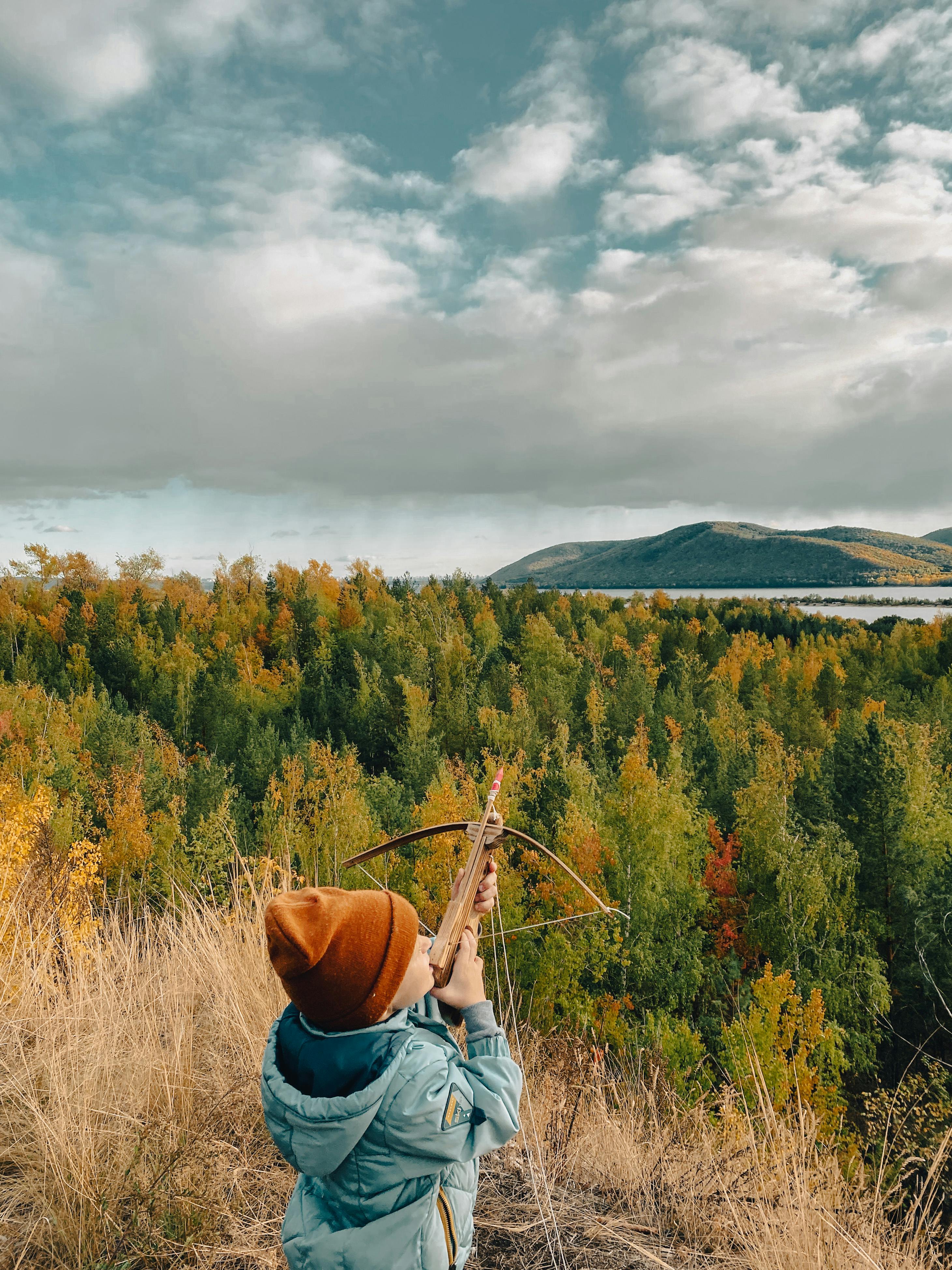Woman Pulling Back Arrow in Bow · Free Stock Photo