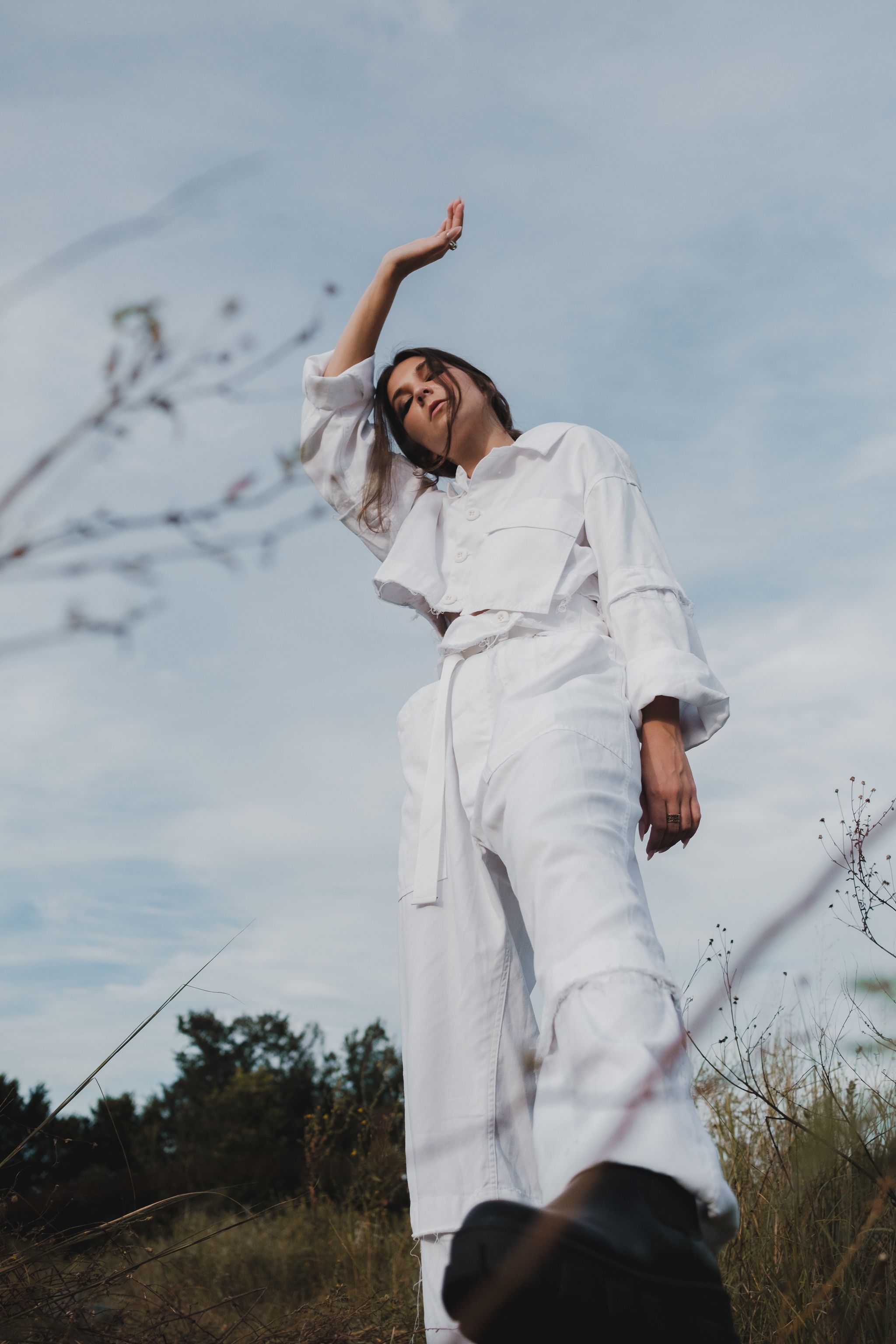 Woman Raising Her Hands · Free Stock Photo