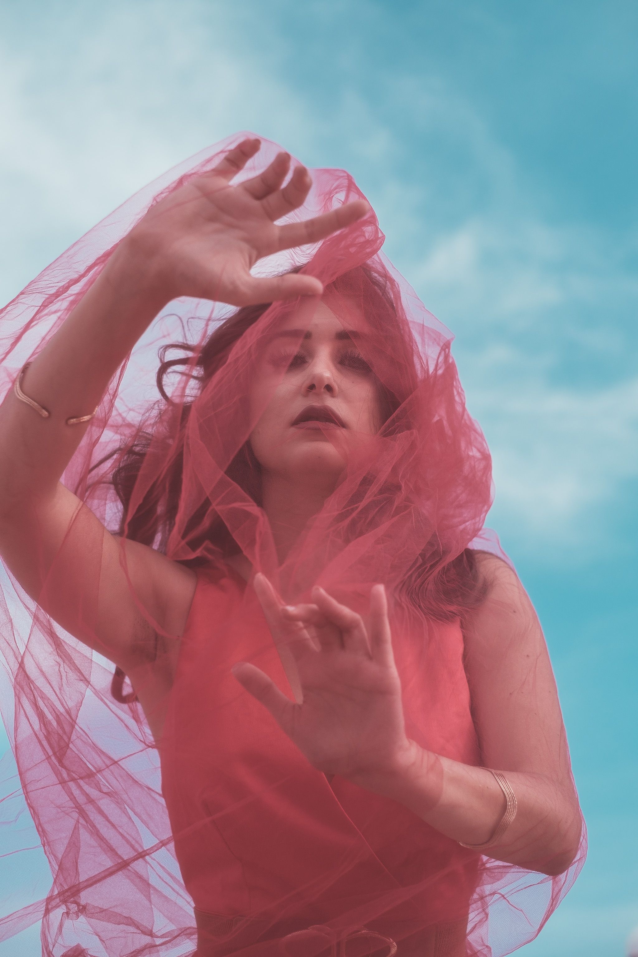 Person Holding a Sheer Fabric · Free Stock Photo
