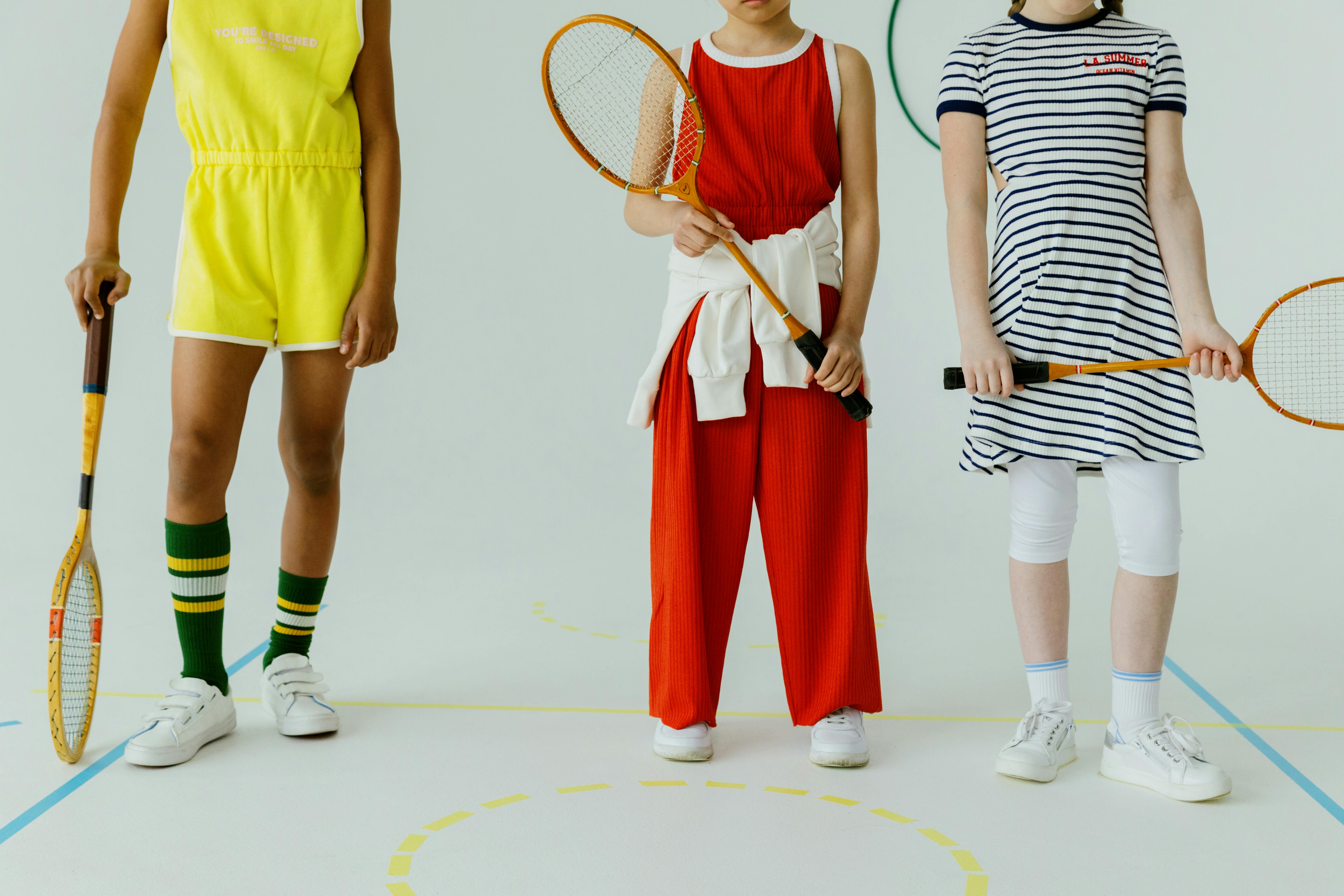 Kids in Sportswear Holding Rackets · Free Stock Photo