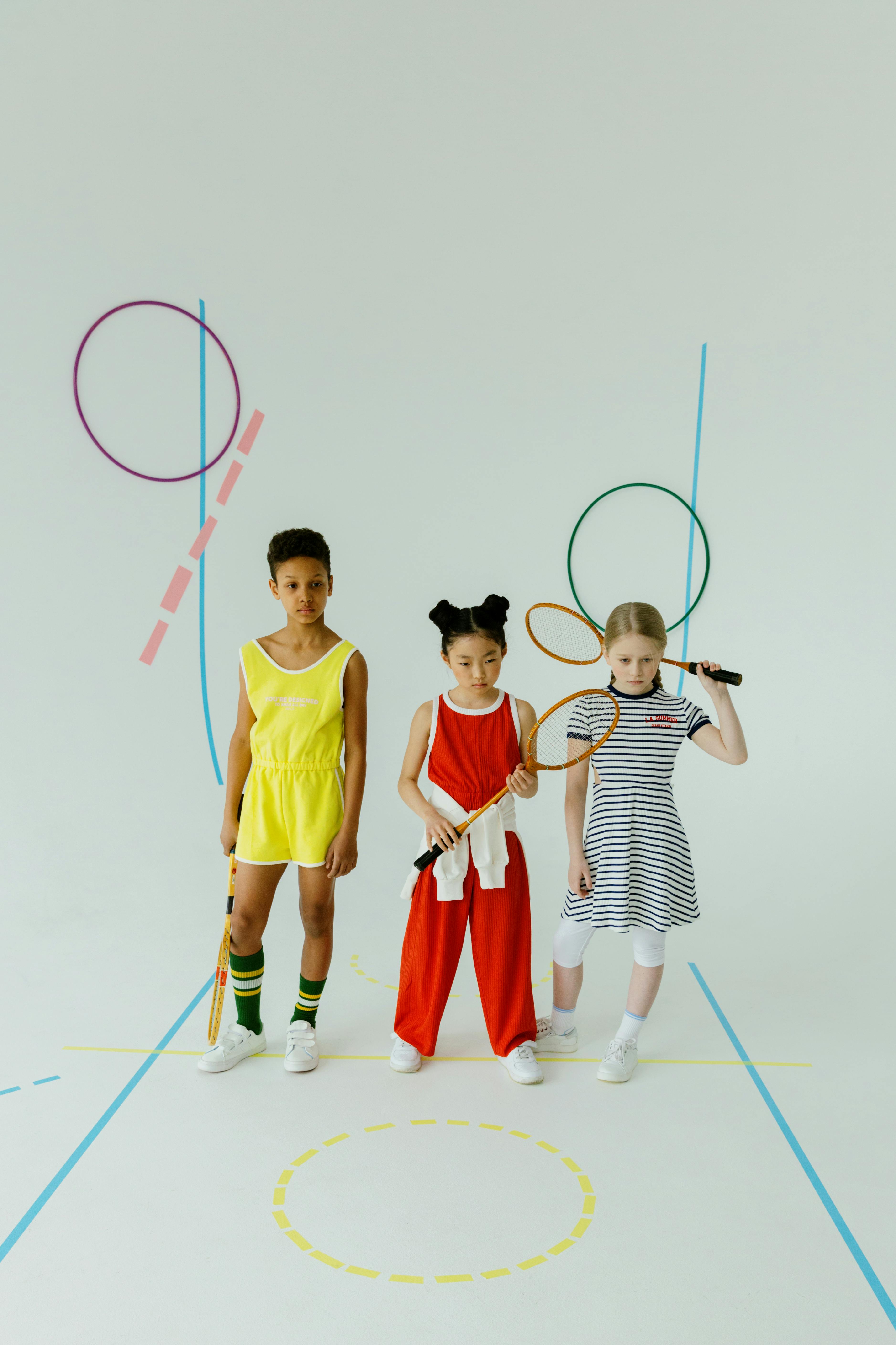Photo of Girls Holding Rackets · Free Stock Photo