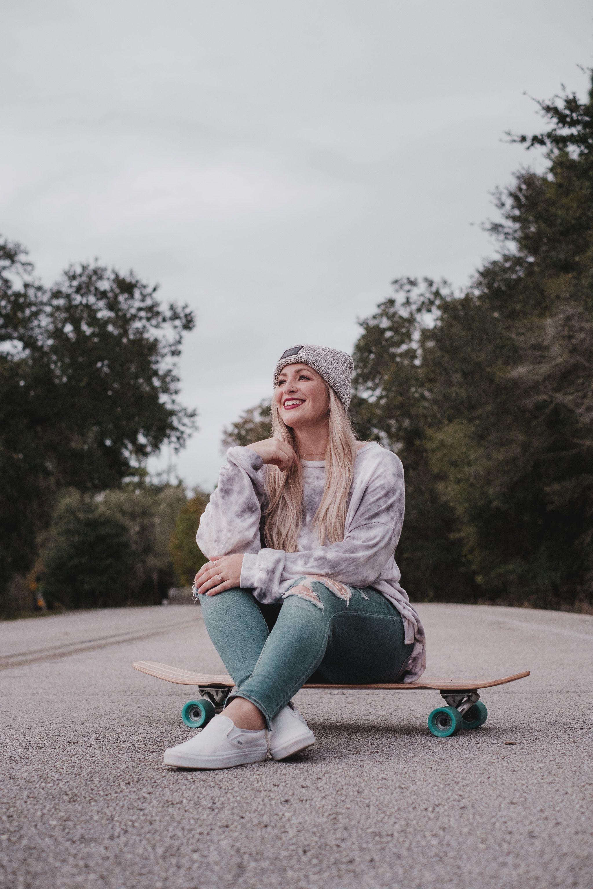 Female Skateboarders Sitting on a Step Together · Free Stock Photo