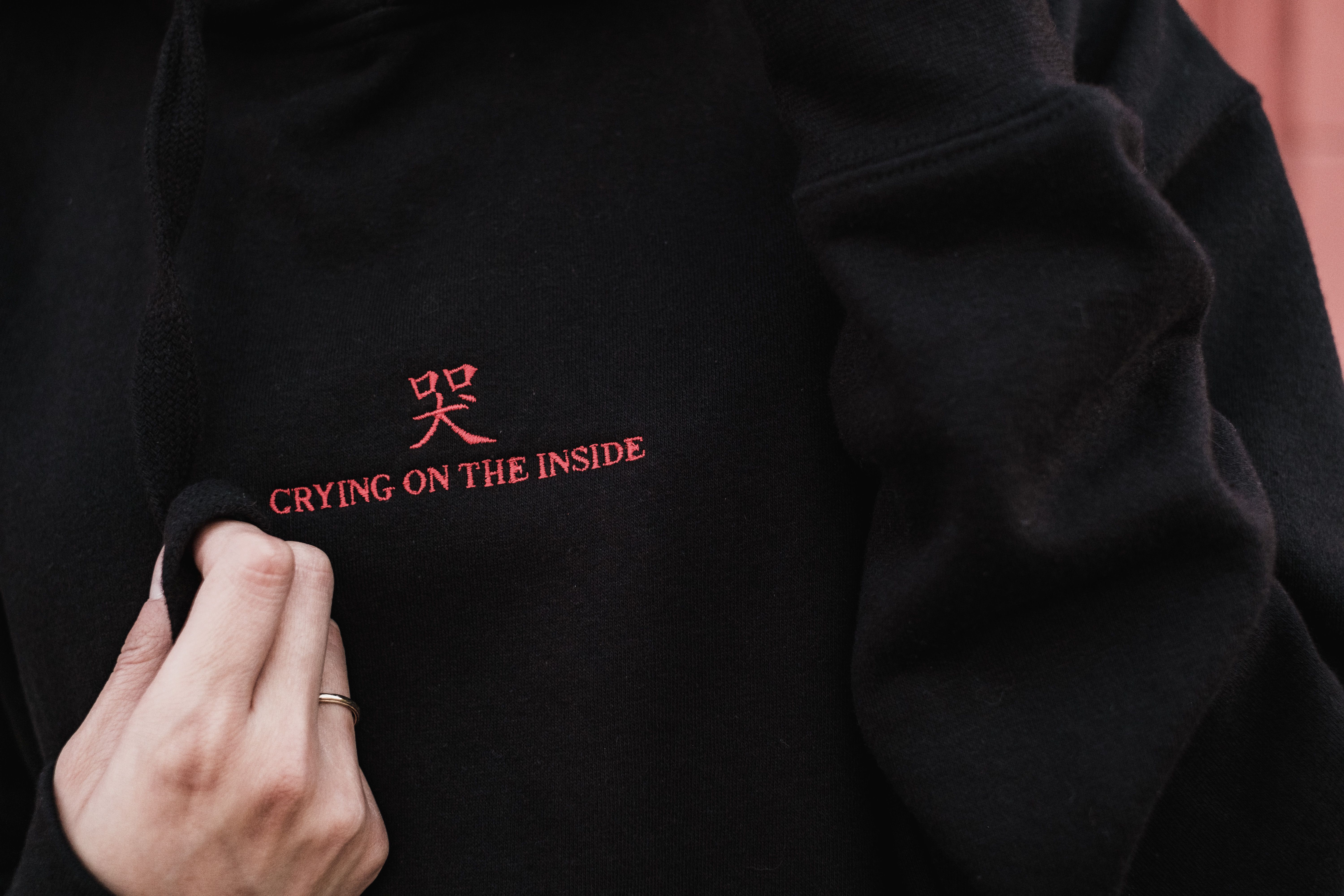Blonde Person Wearing Black Hoodie Jacket with Message · Free Stock Photo
