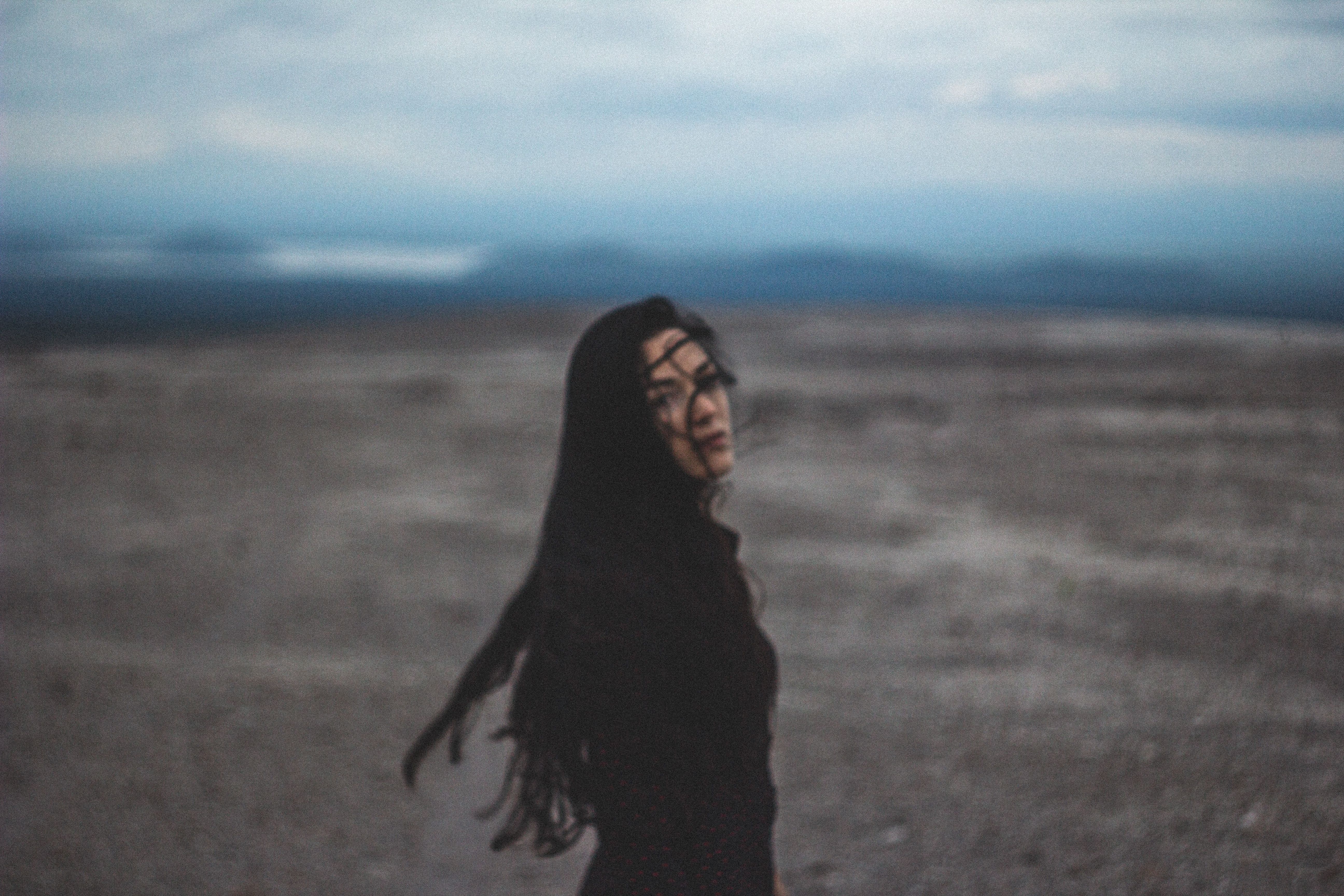Long Haired Woman Looking Back · Free Stock Photo