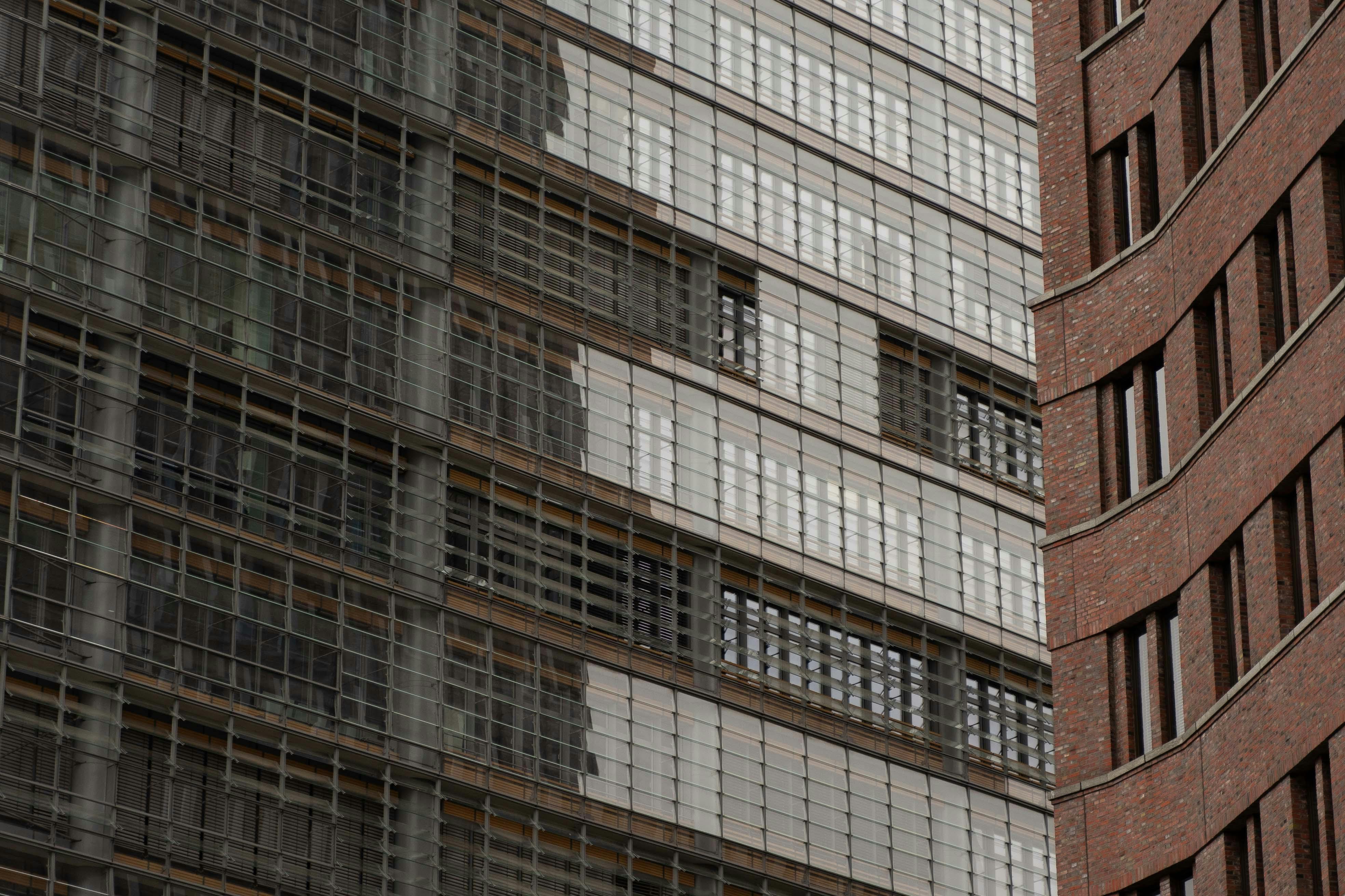 Tall Building with Glass Windows · Free Stock Photo
