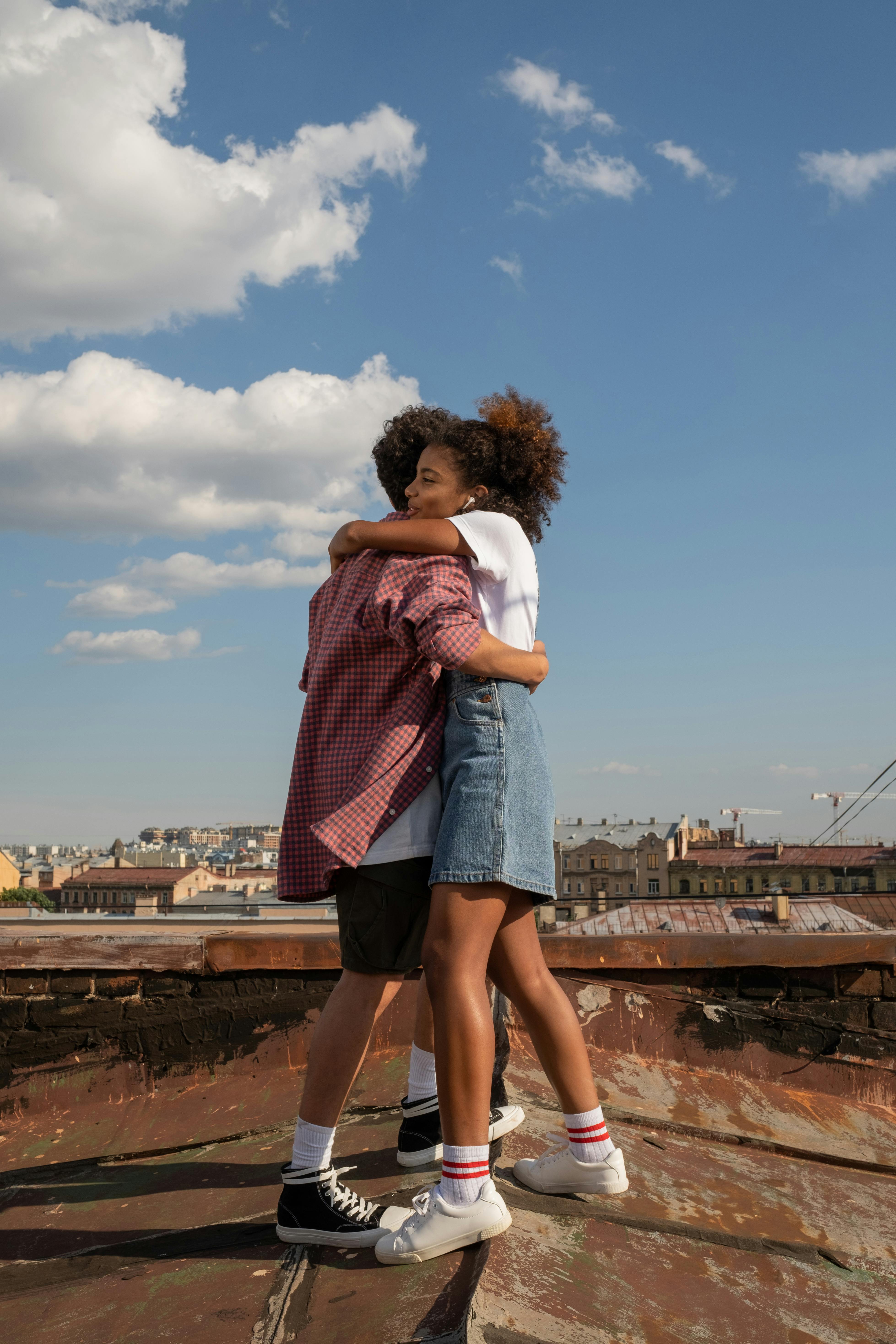 Teenage Couple Hugging · Free Stock Photo