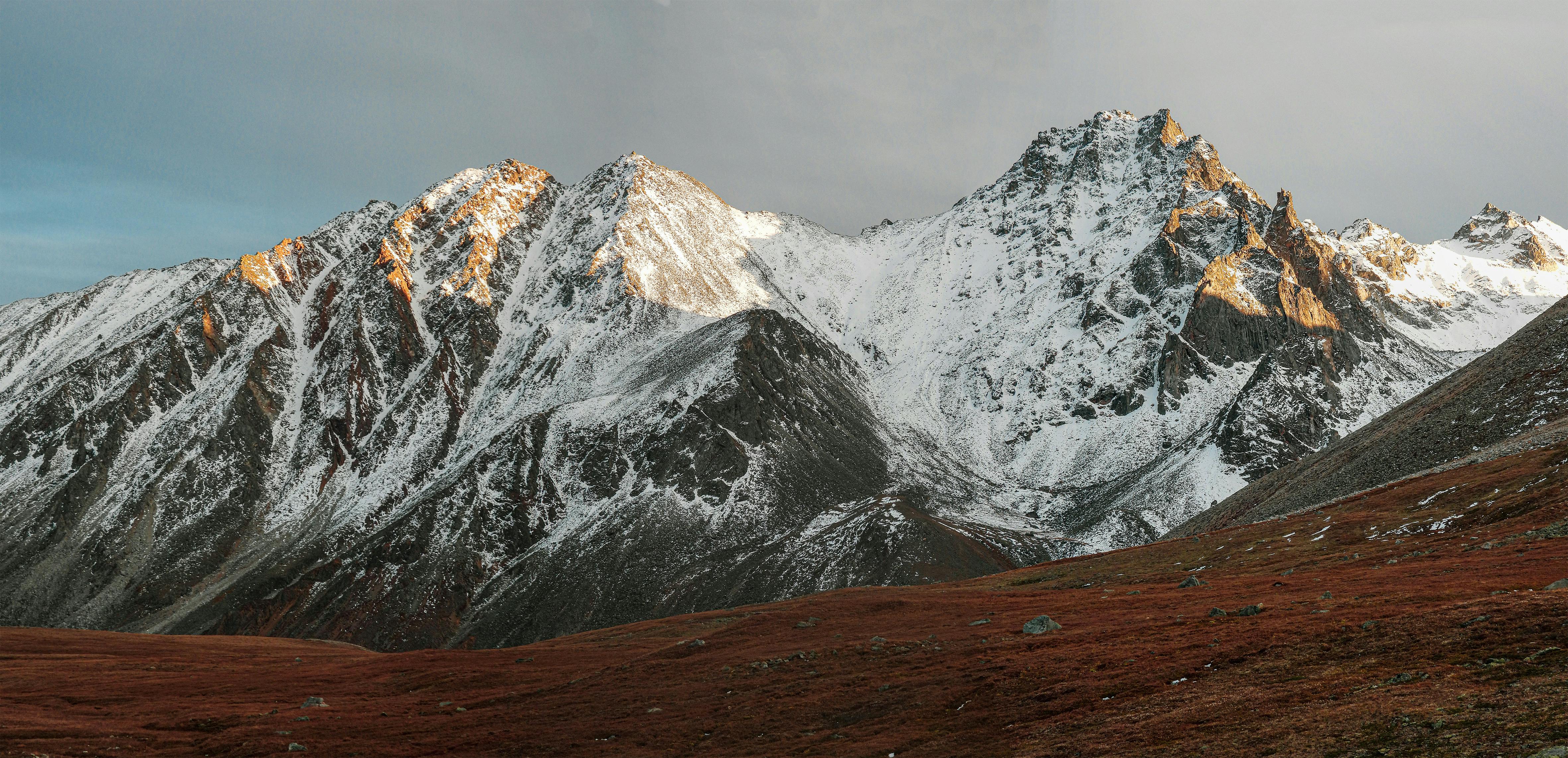 Snow Covered Rocky Mountain · Free Stock Photo