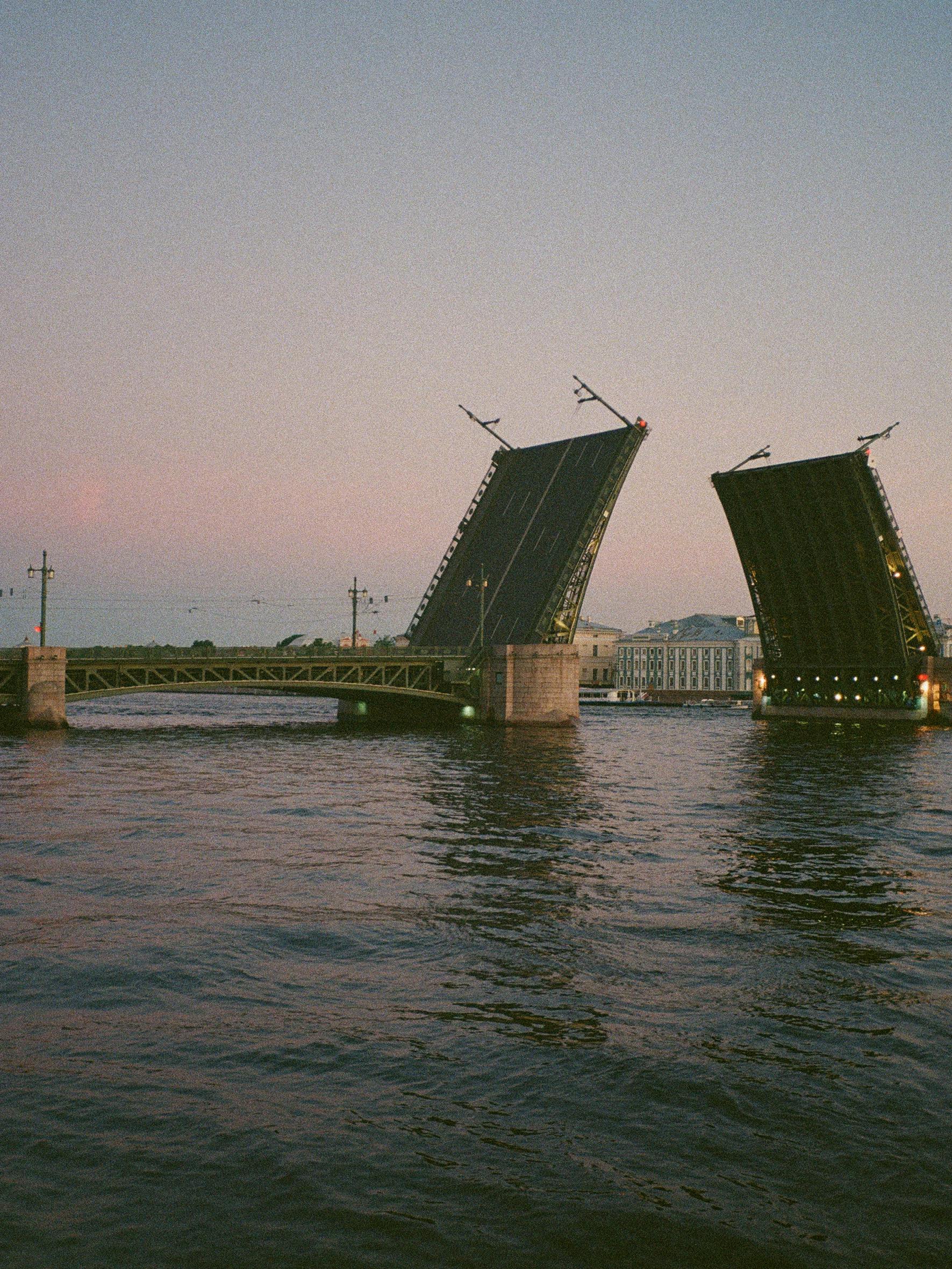 River under Drawbridge during Sunset · Free Stock Photo