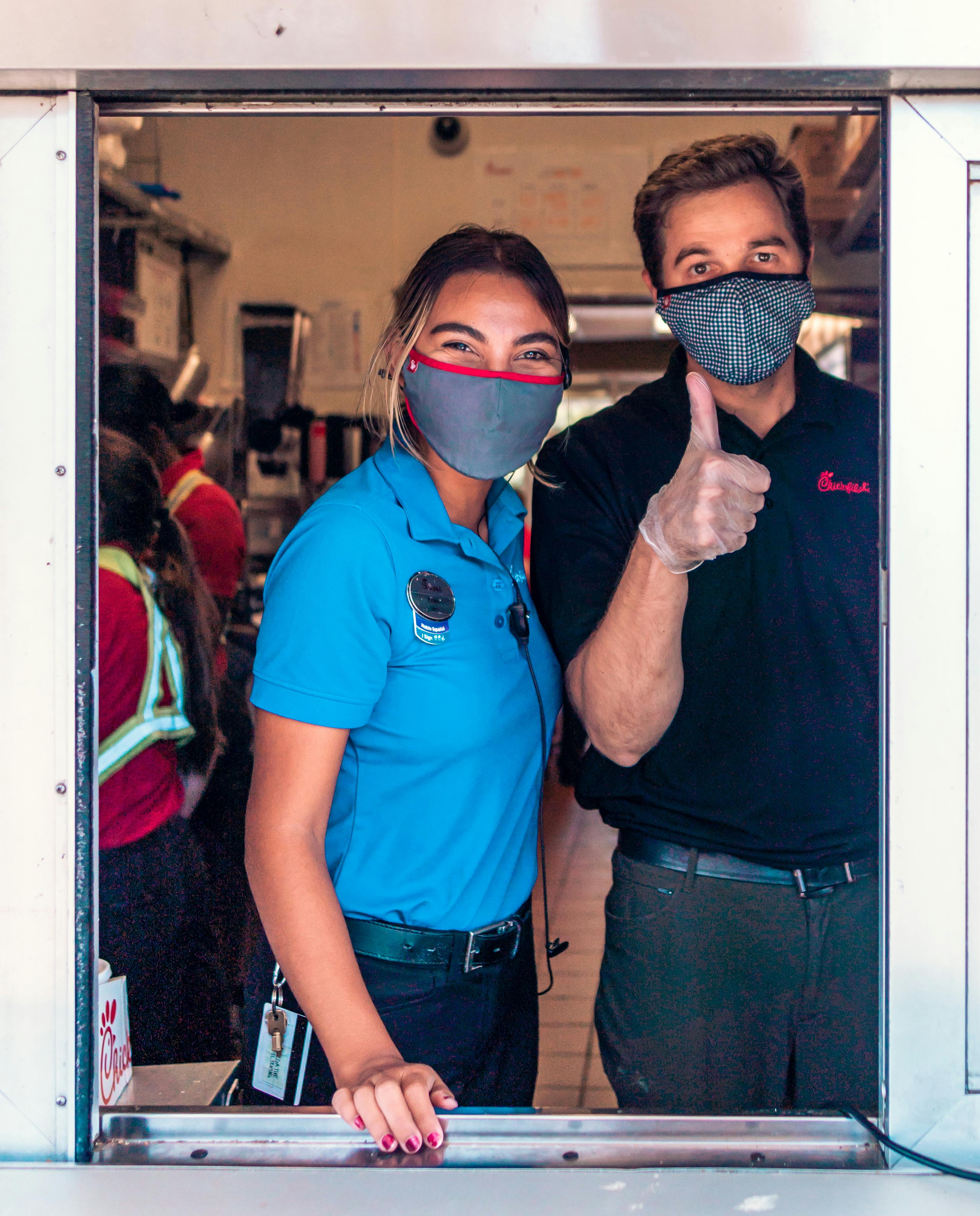 A Man and Woman Wearing Face Mask · Free Stock Photo