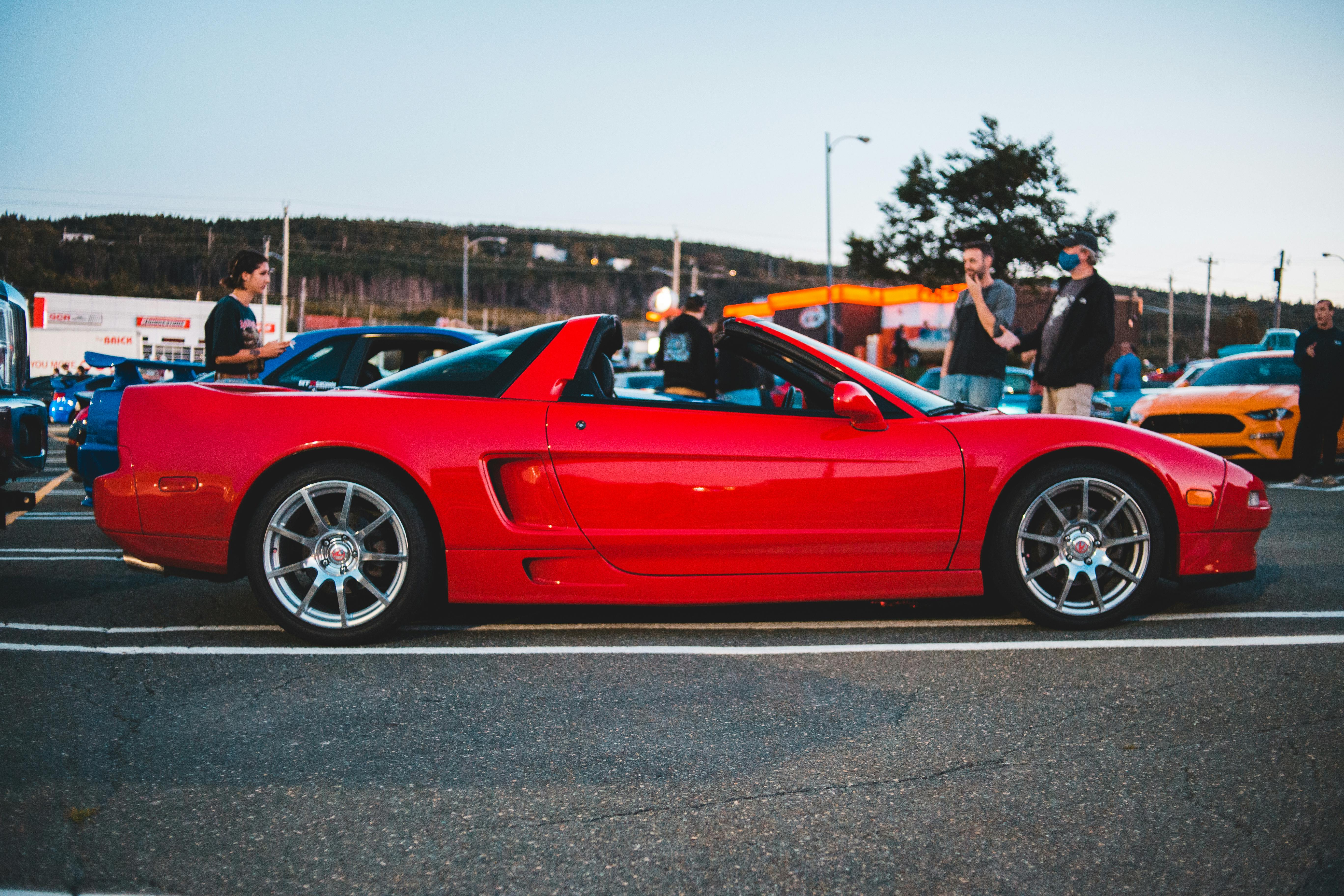 Red Car Parked on the Road · Free Stock Photo