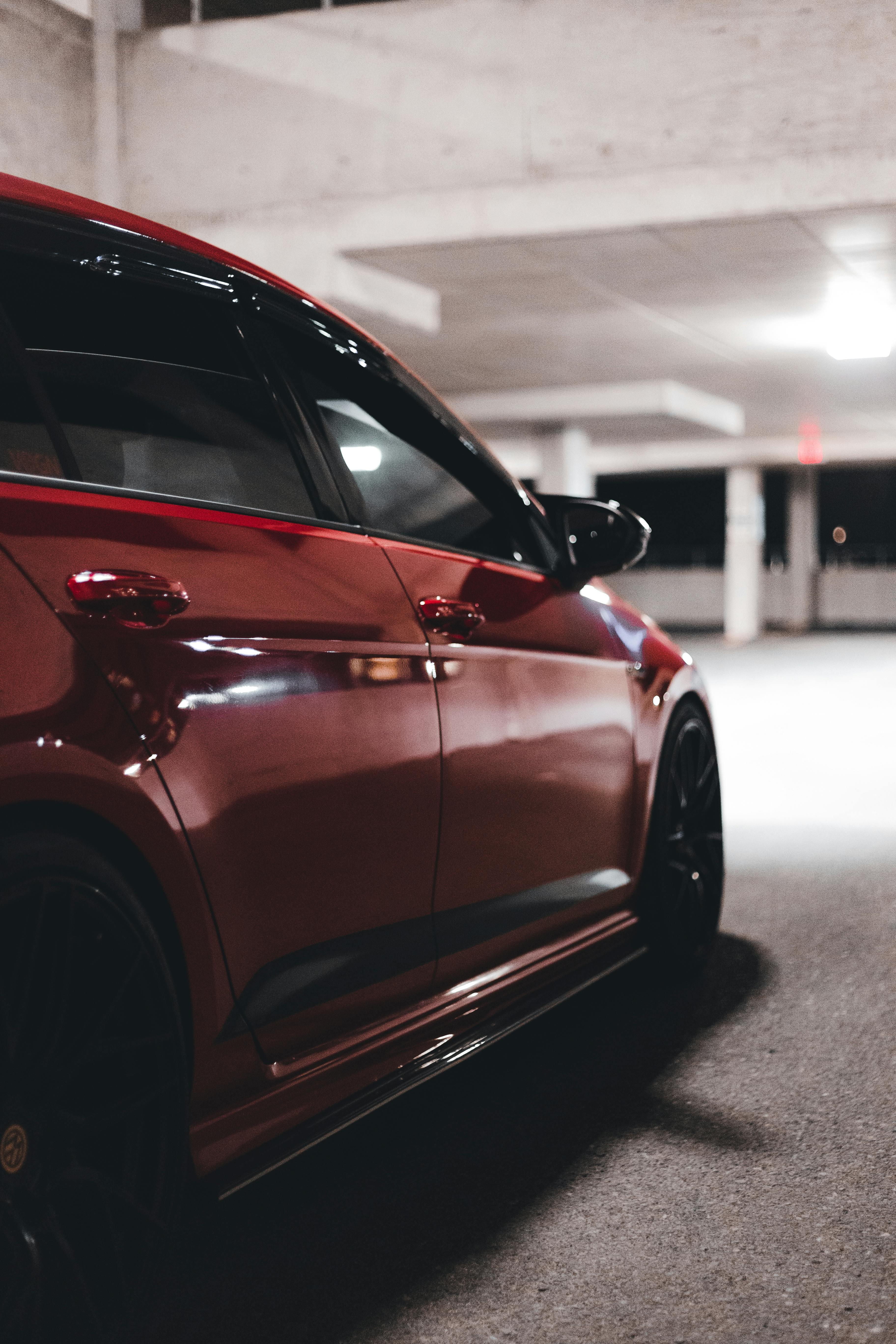 Red Car on a Parking Lot · Free Stock Photo