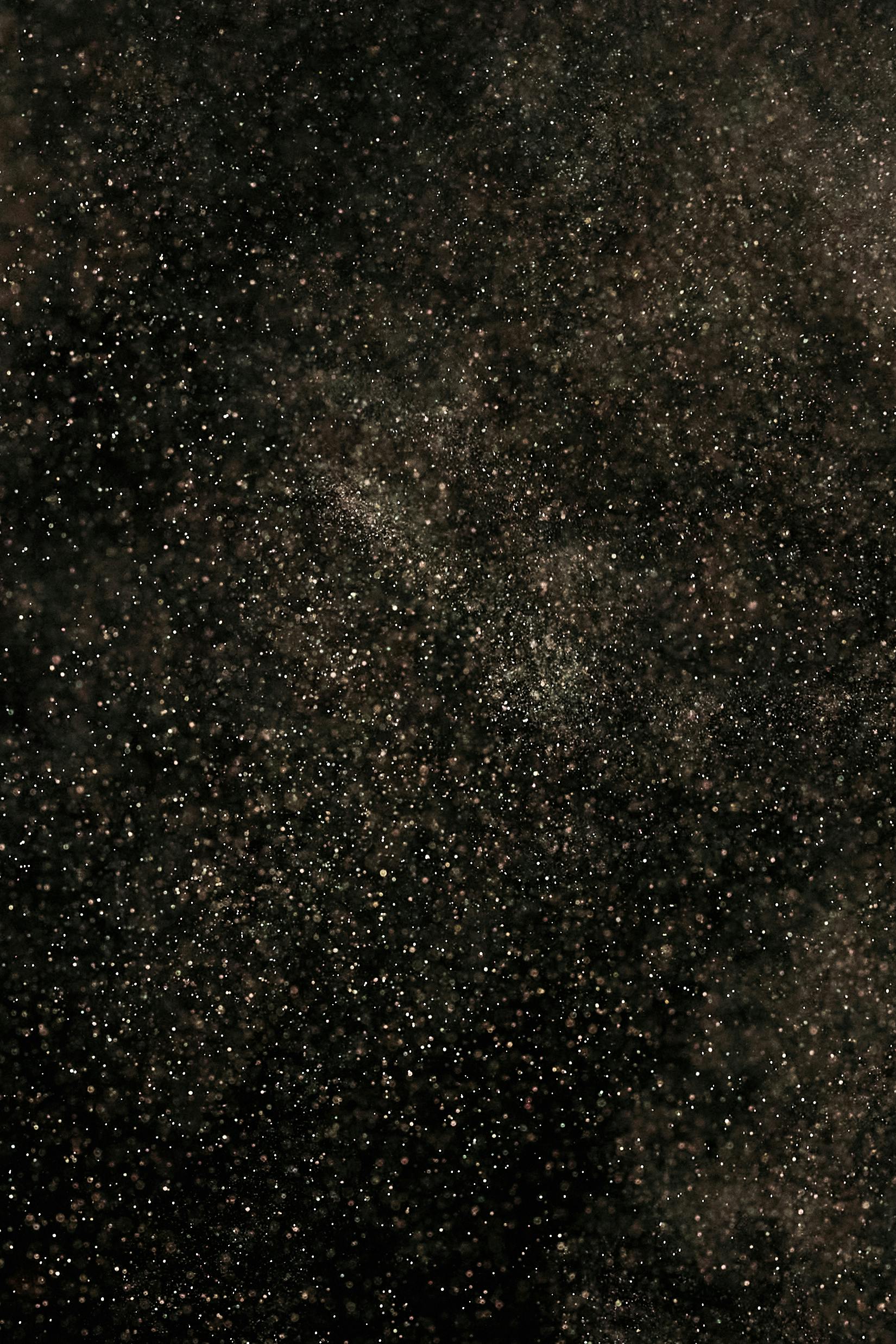 White Dust Particles on Black Background · Free Stock Photo