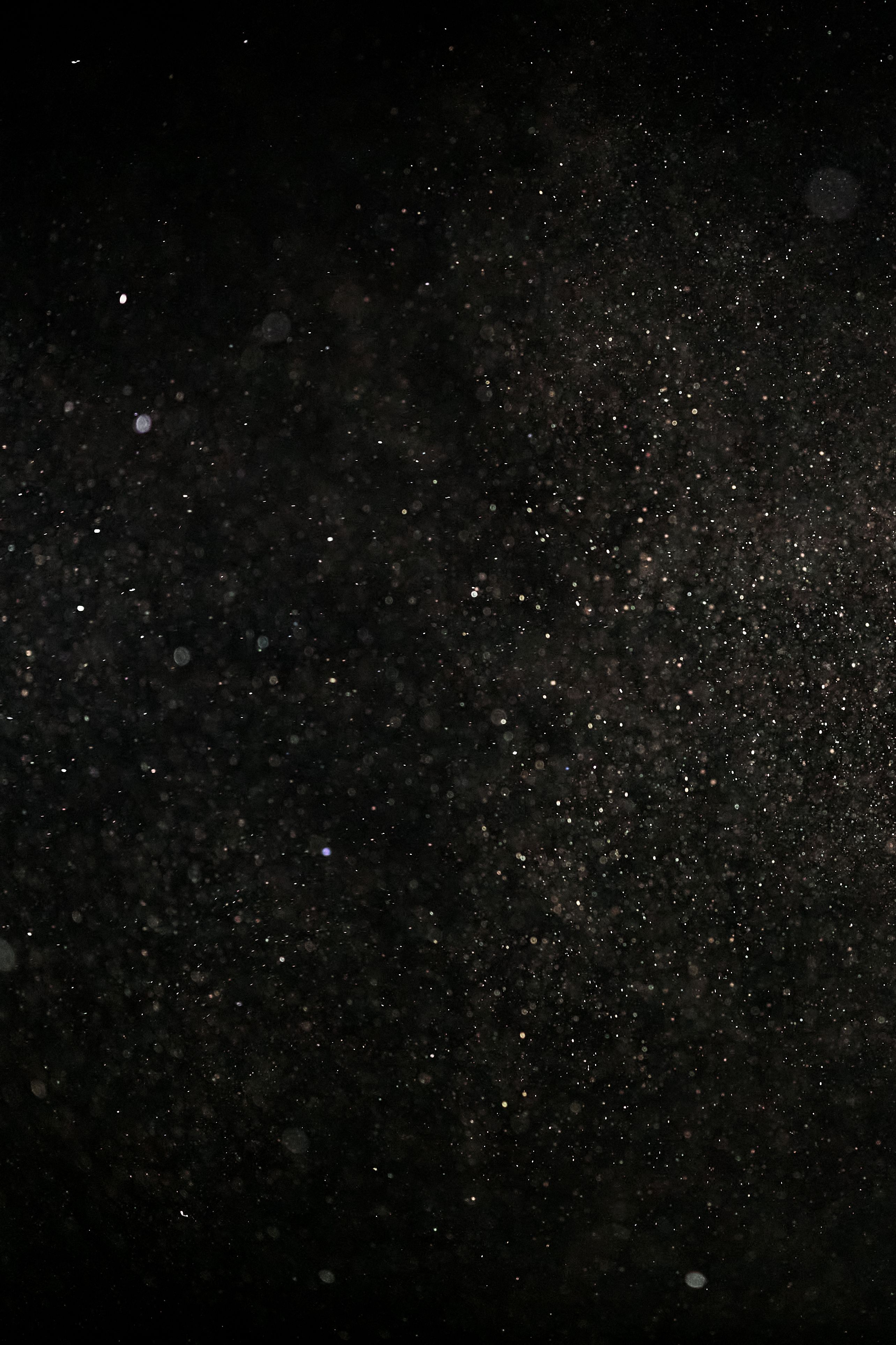 White Dust Particles on Black Background · Free Stock Photo