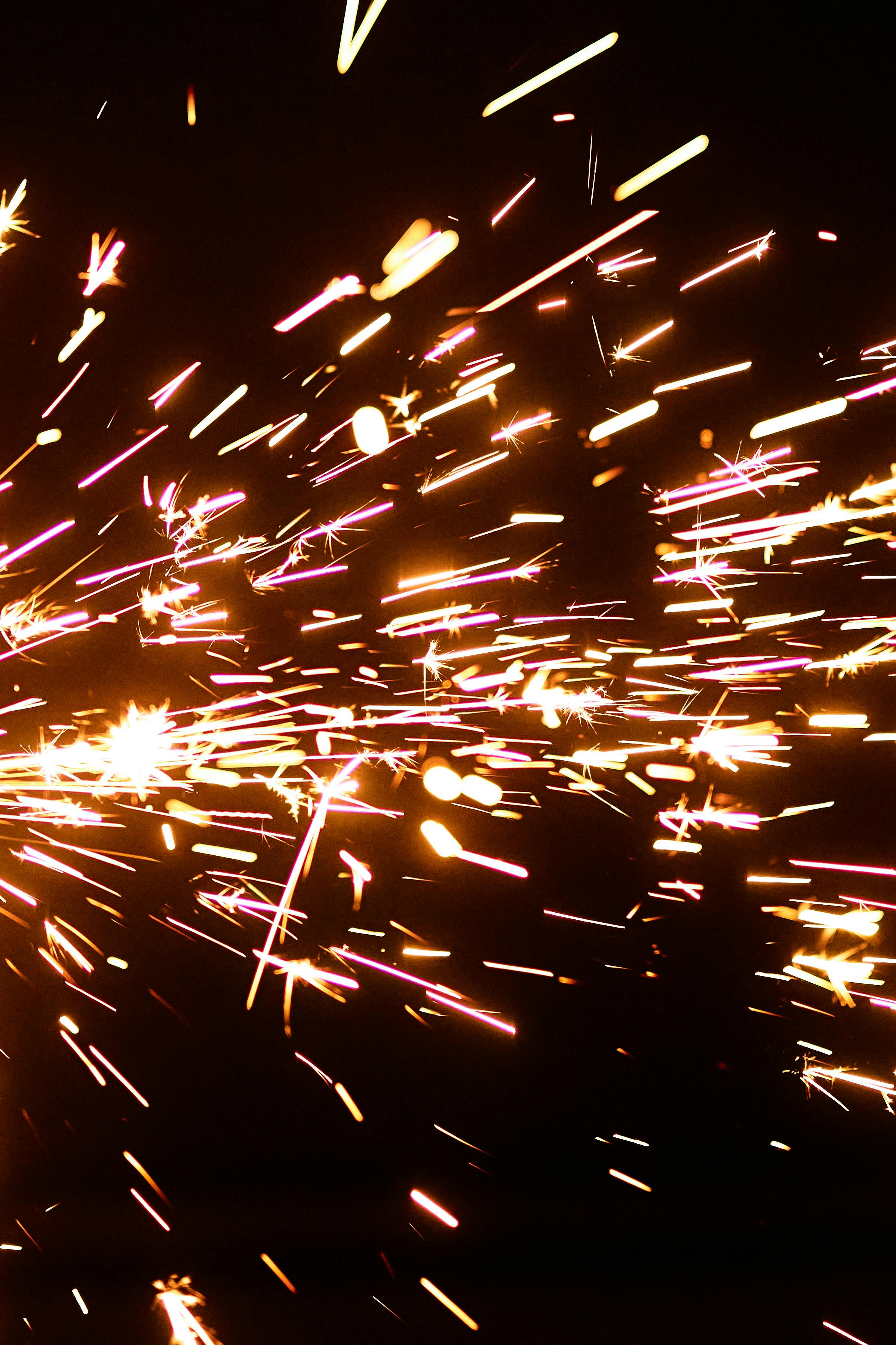 Flashing Sparks on Black Background · Free Stock Photo