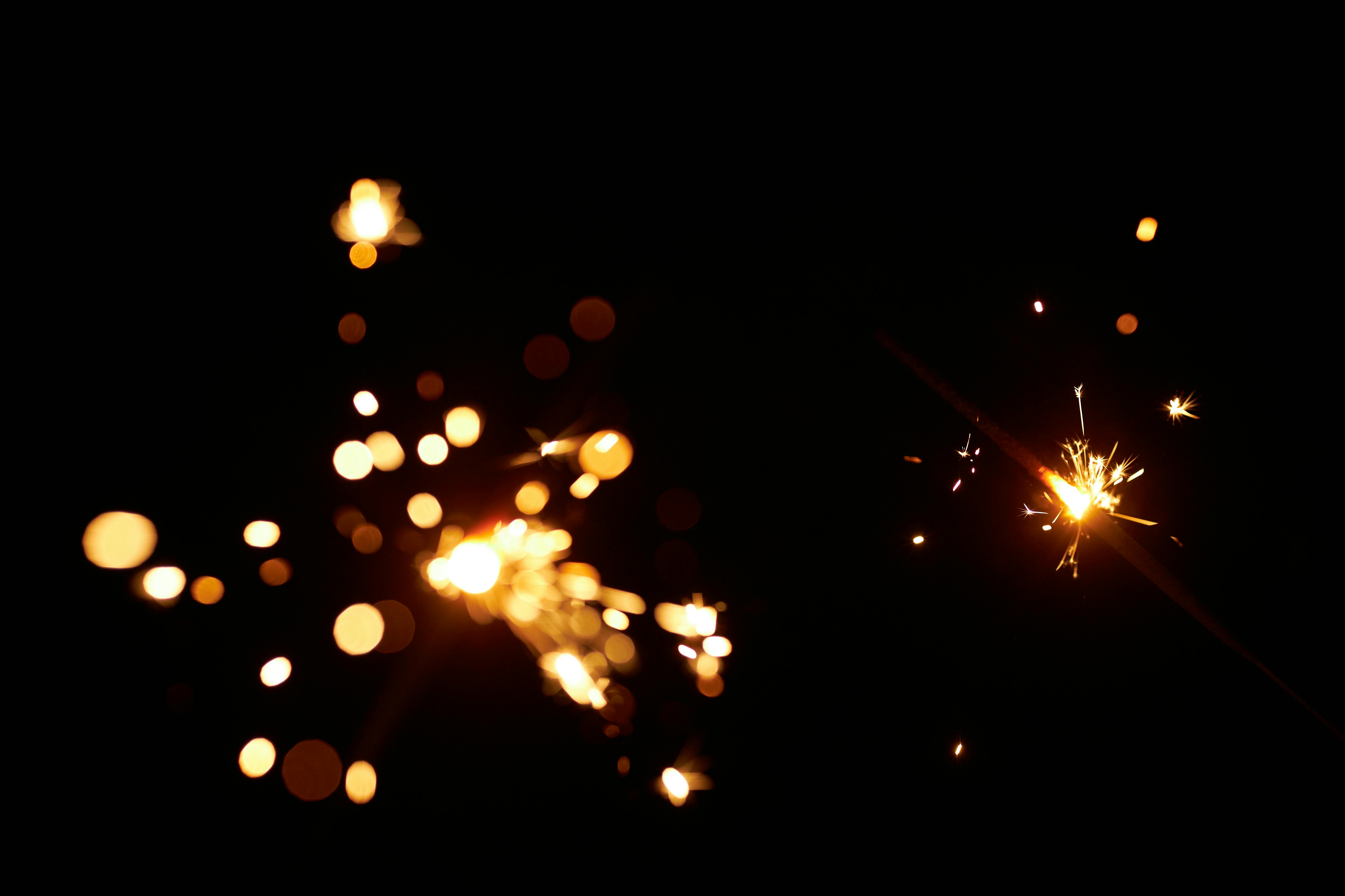 Sparkling Lights on Black Background · Free Stock Photo