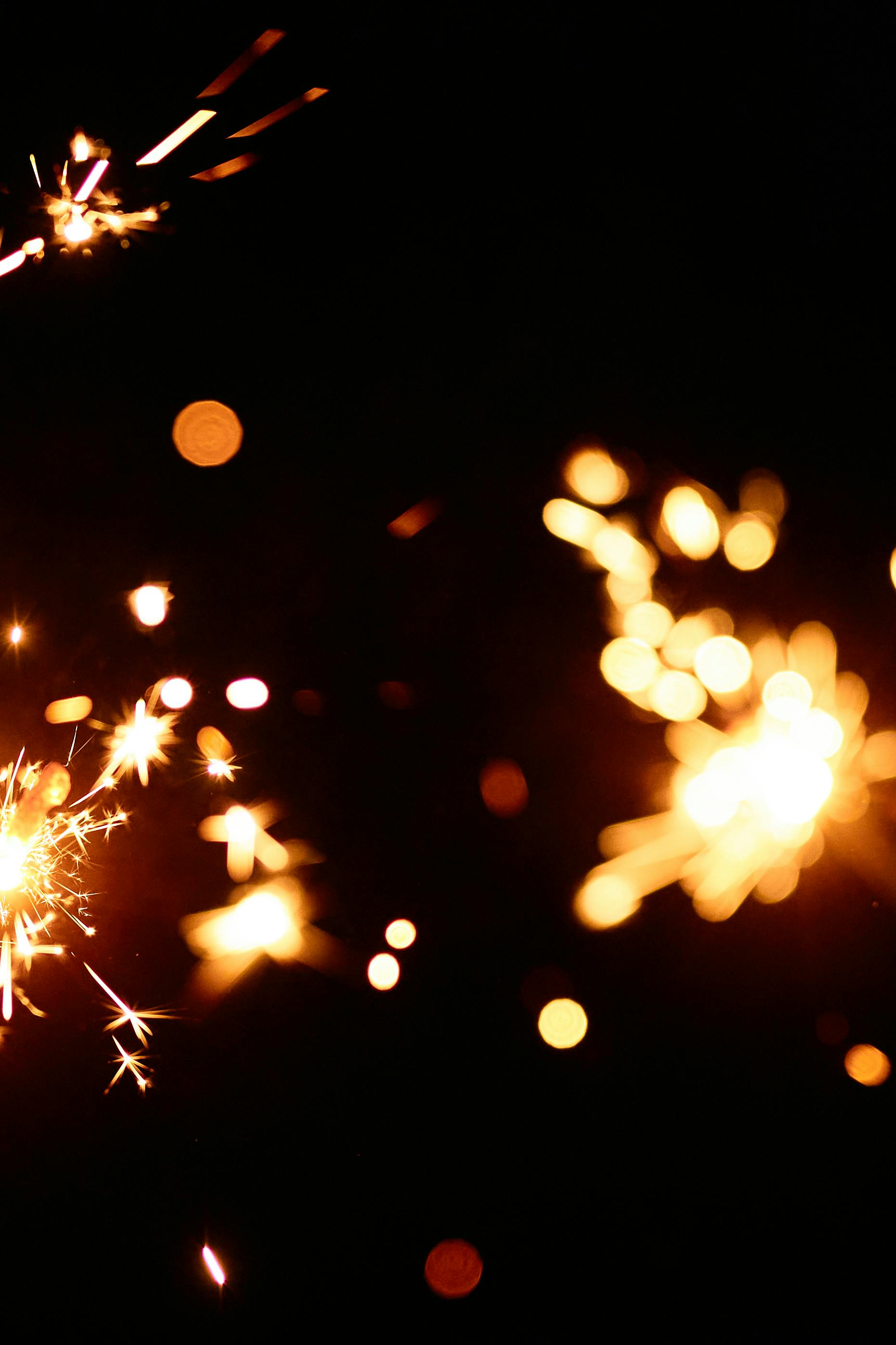 Sparkling Lights on Black Background · Free Stock Photo