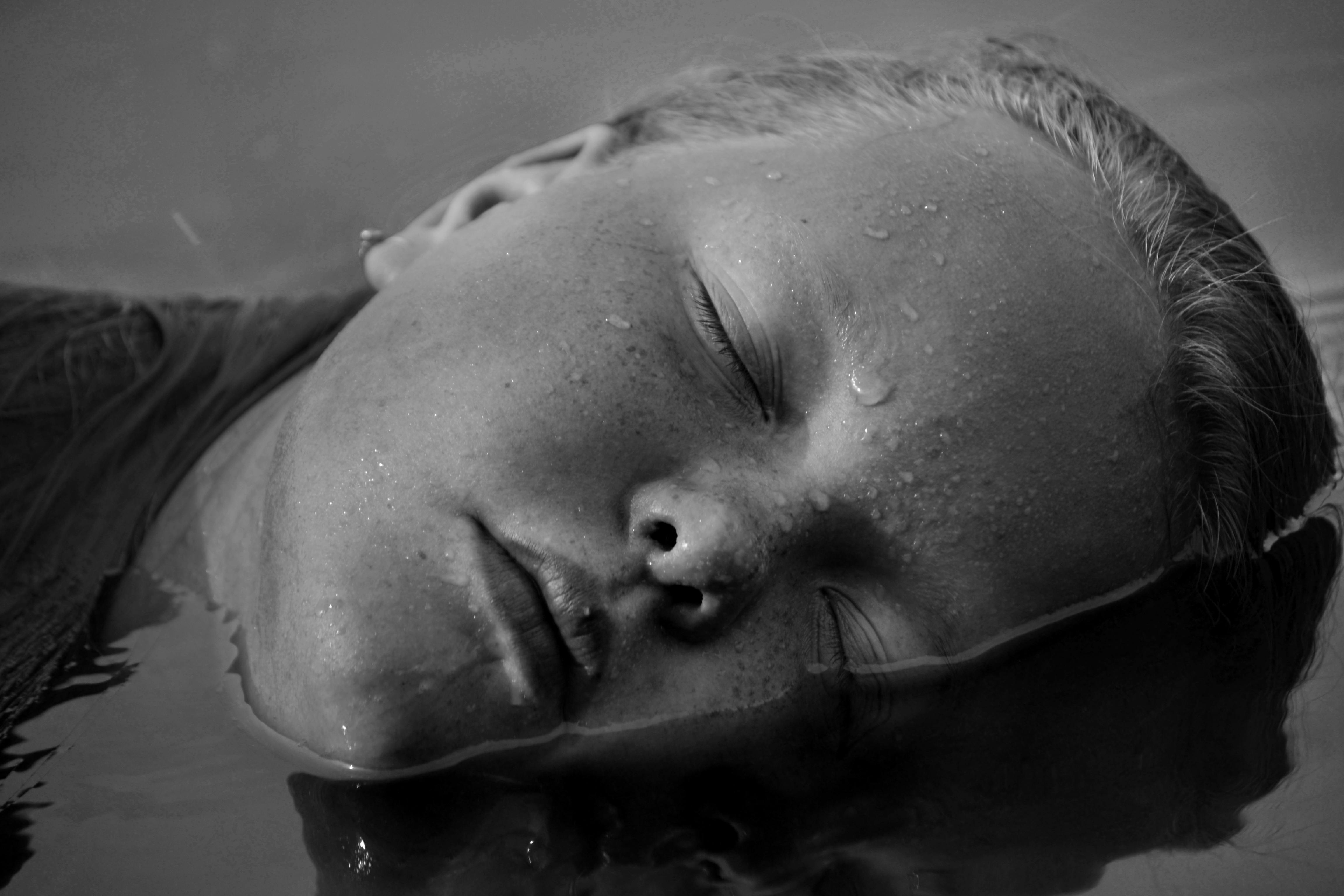 Person Resting on Water · Free Stock Photo