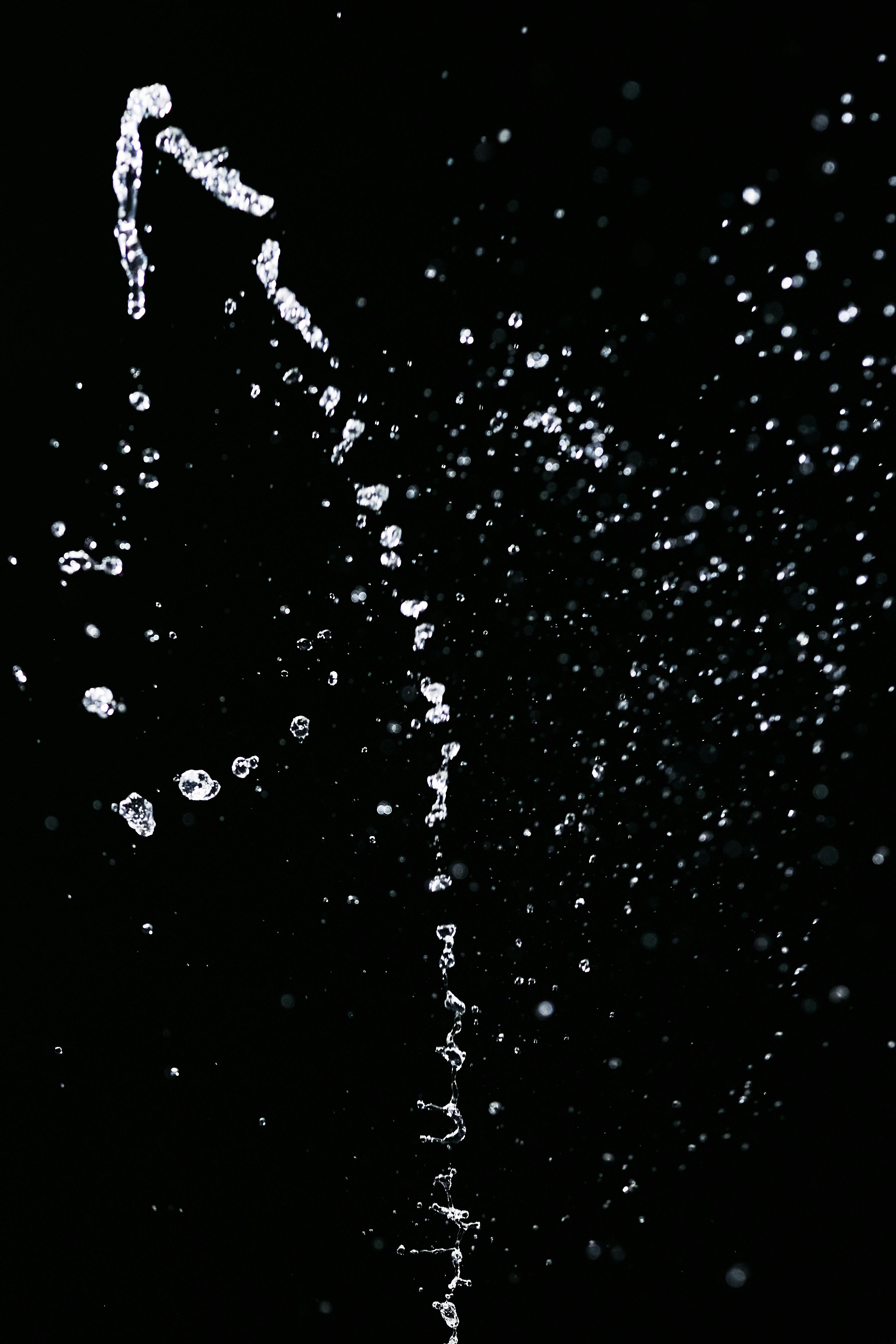 High-Speed Photography of Particles of Water Splash · Free Stock Photo