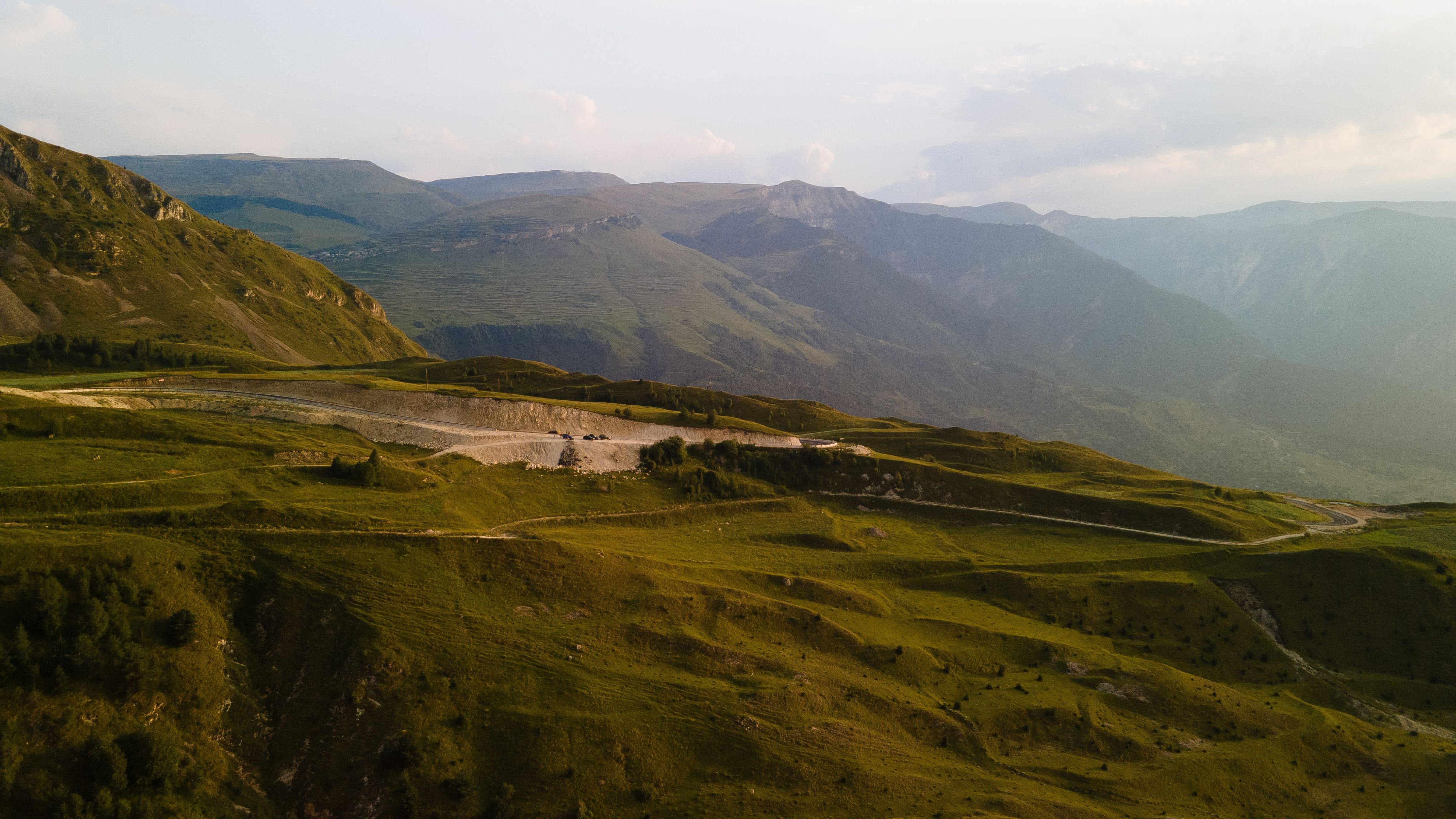Aerial View of Grass Field on Mountain · Free Stock Photo