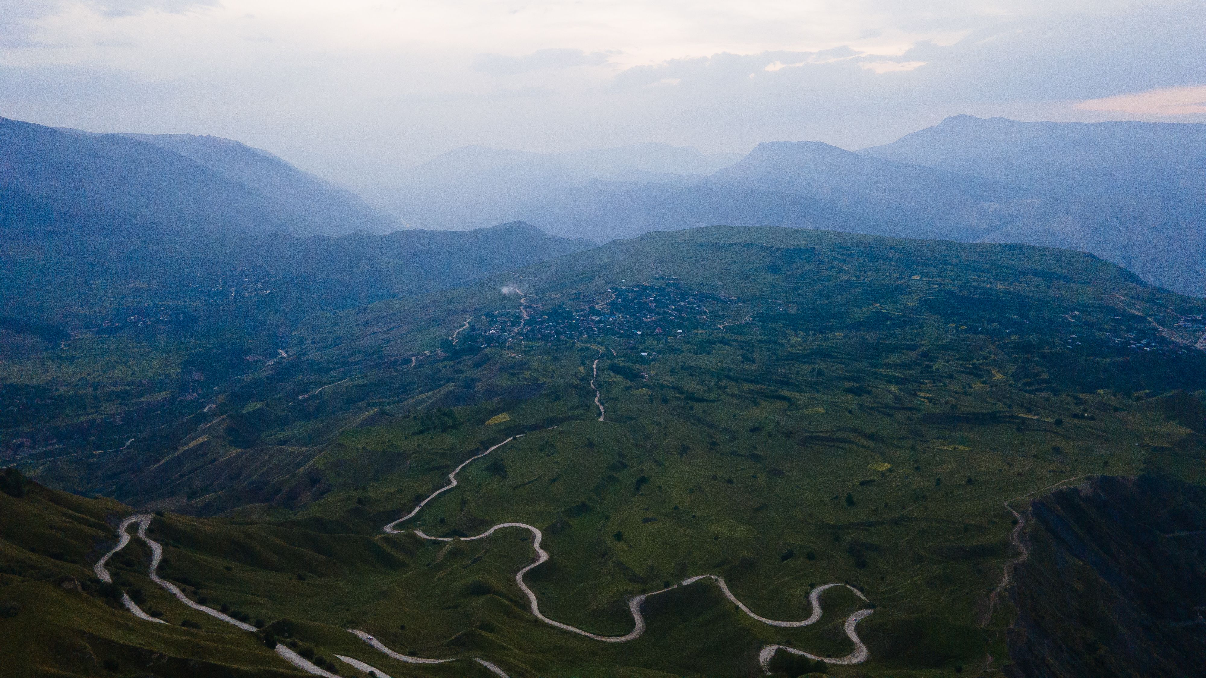 Aerial View of Grass Field on Mountain · Free Stock Photo