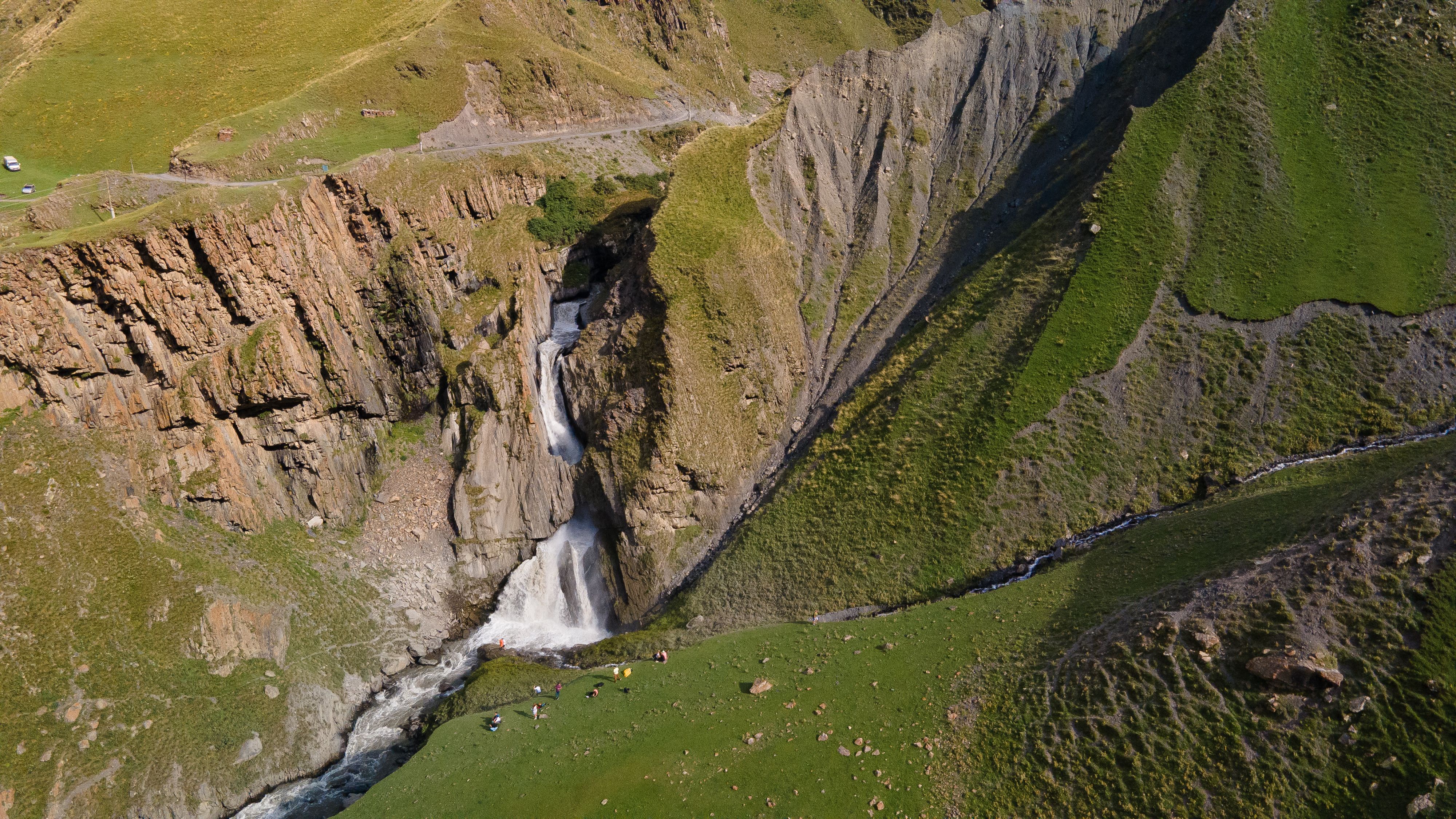 Aerial View of Grass Field on Mountain · Free Stock Photo