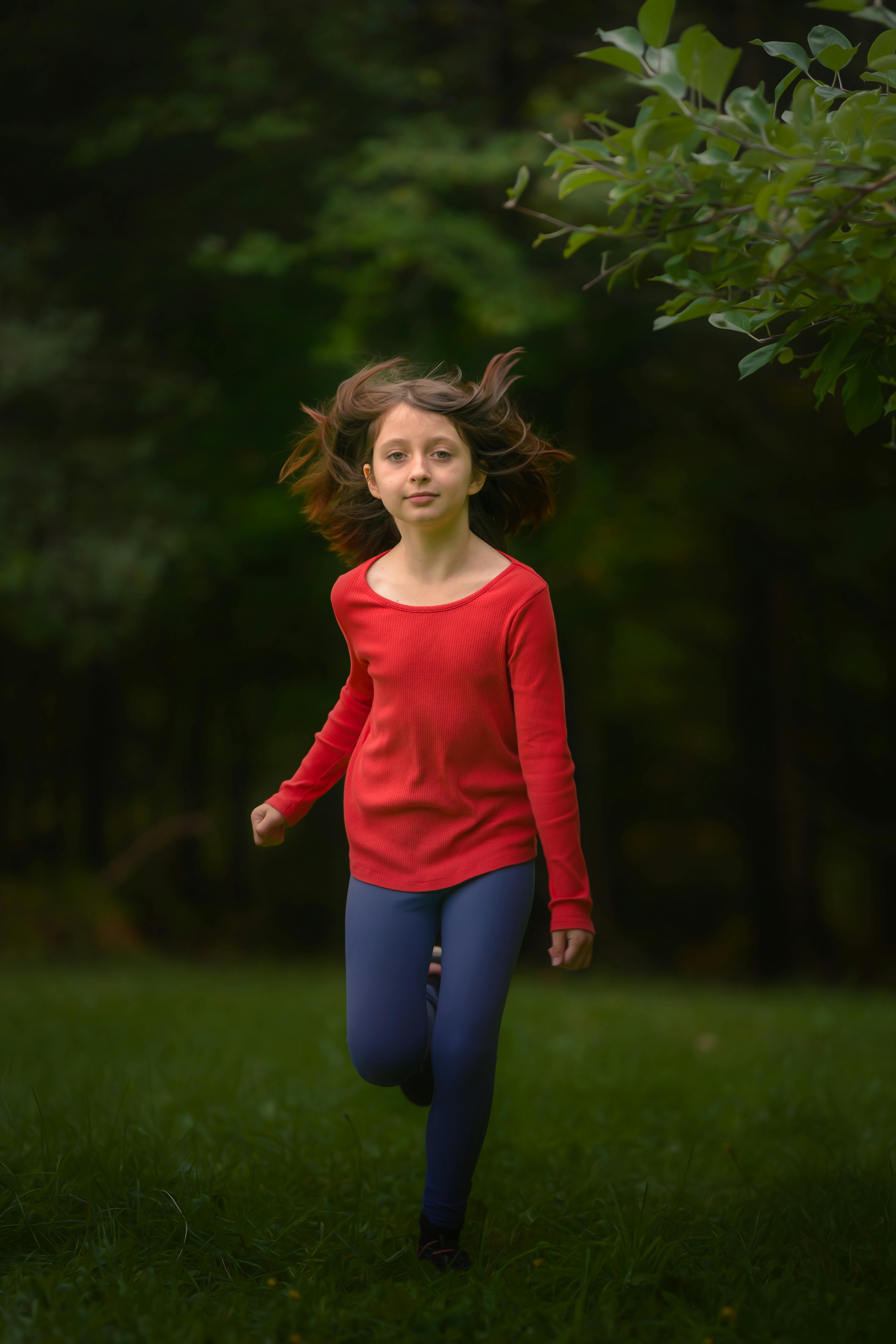 A Girl Running Wearing Red Long Sleeves Shirt · Free Stock Photo
