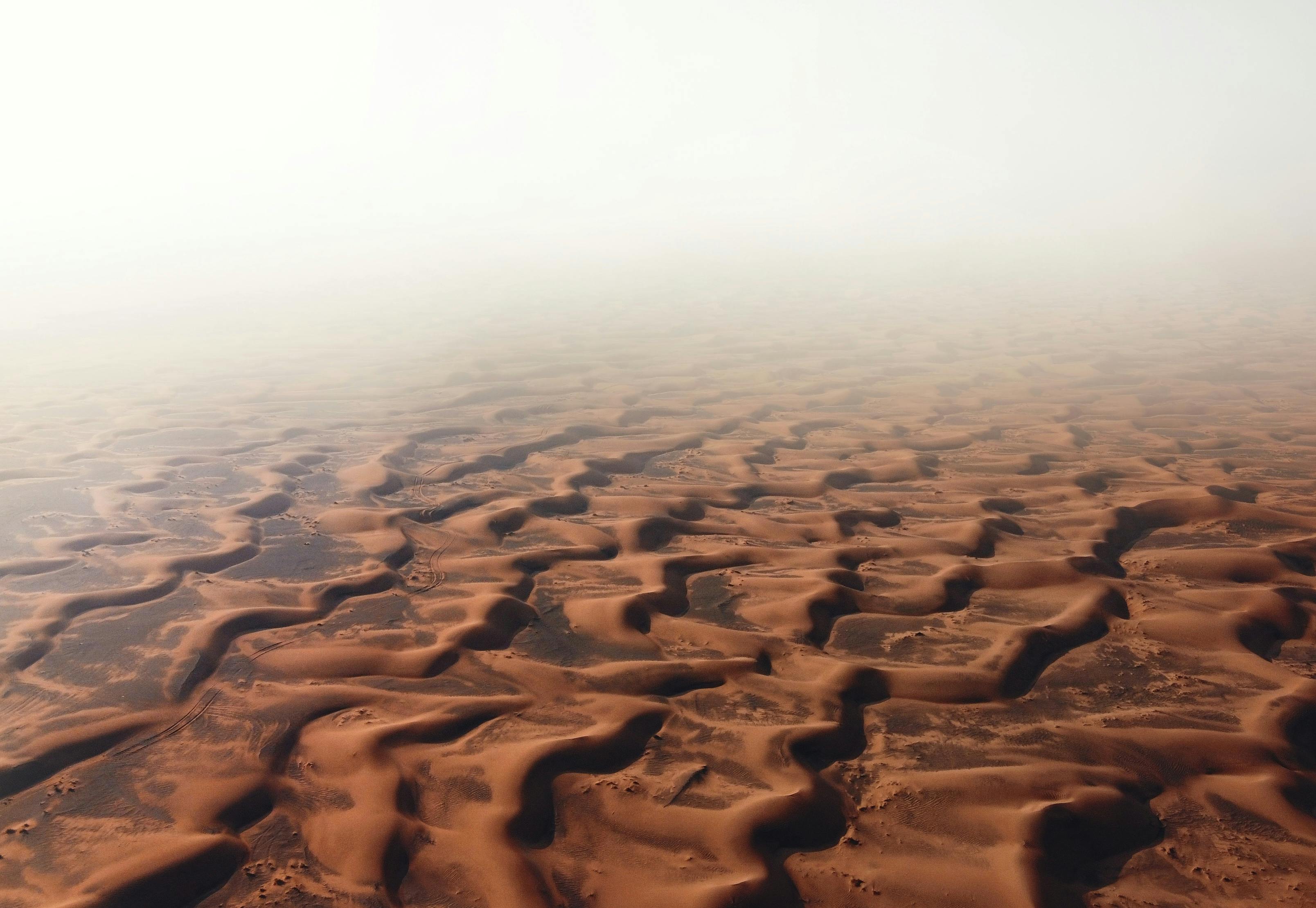 Desert Sand Under Clear Sky · Free Stock Photo