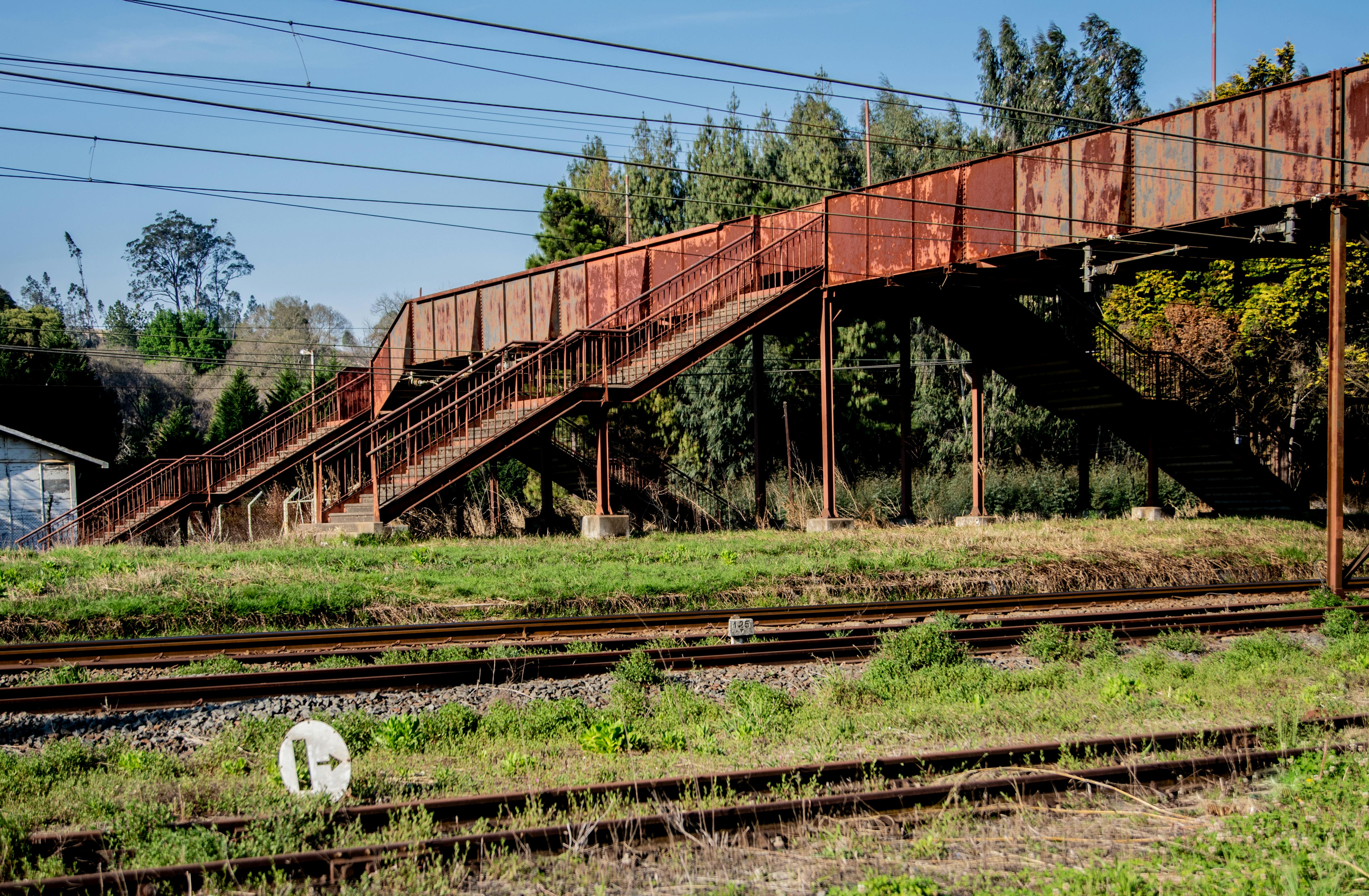 Brown Rusty Bridge Near the Railway Track · Free Stock Photo