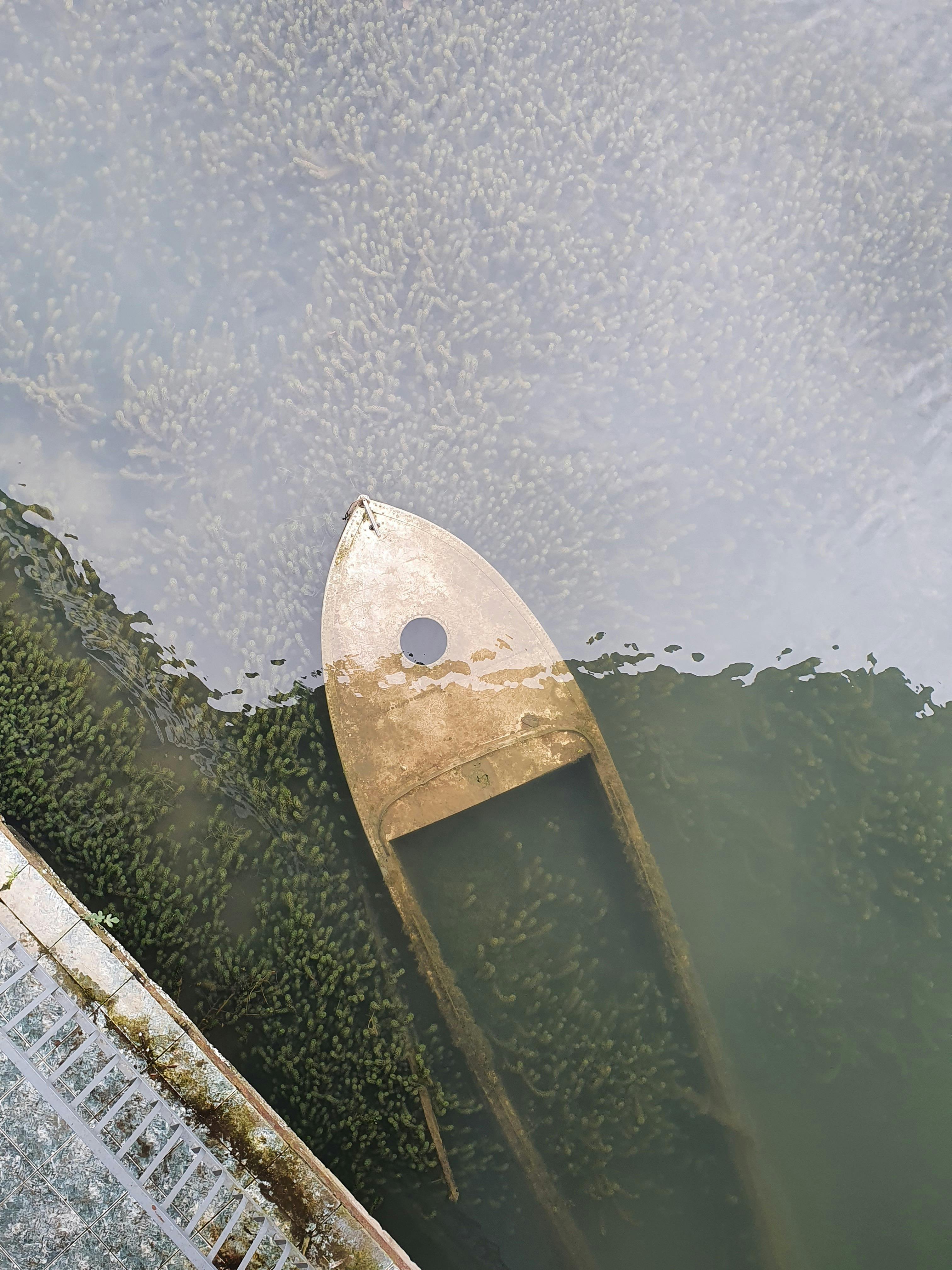 A Rowboat Under the Water · Free Stock Photo