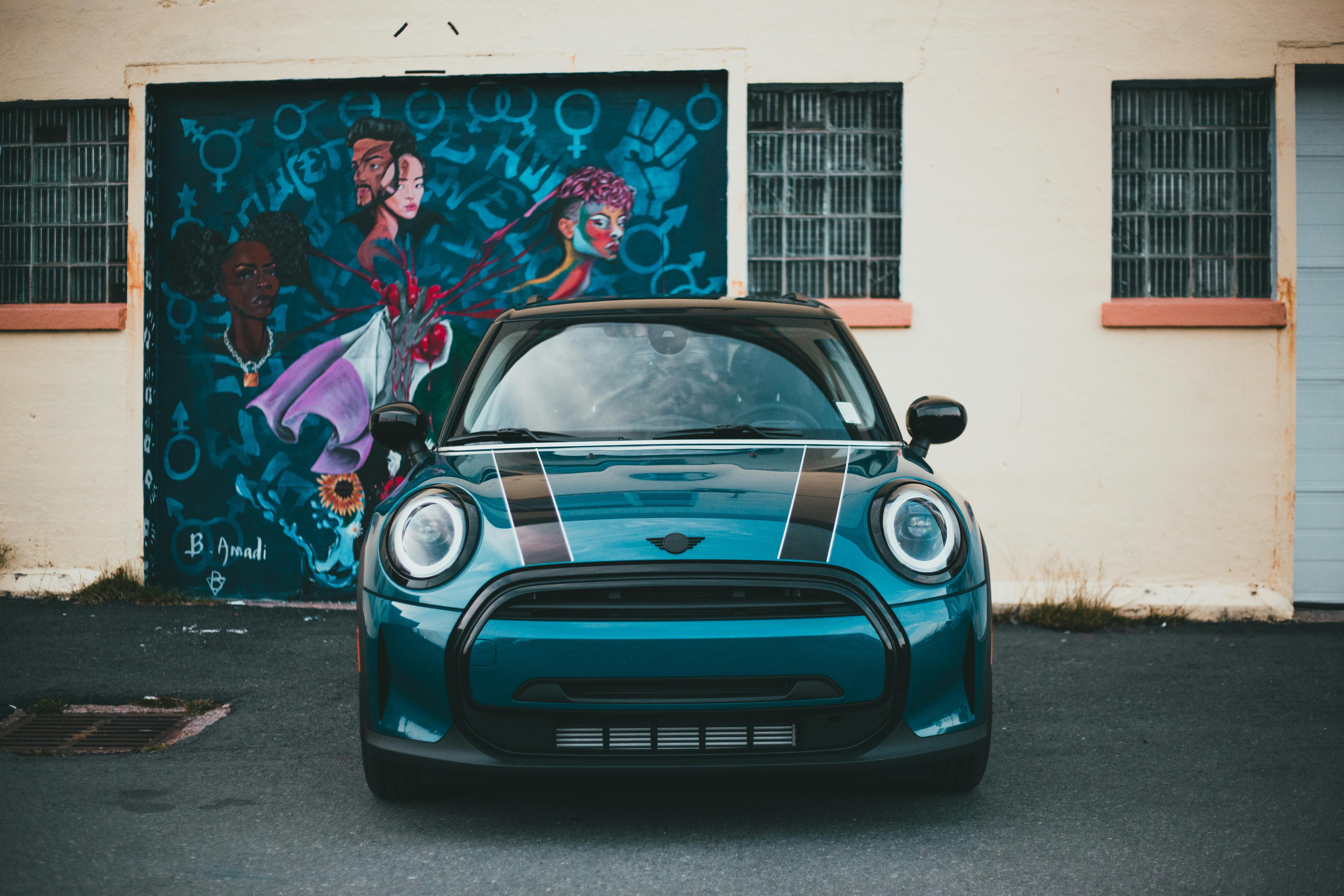 Blue Car Parked on Paved Ground · Free Stock Photo