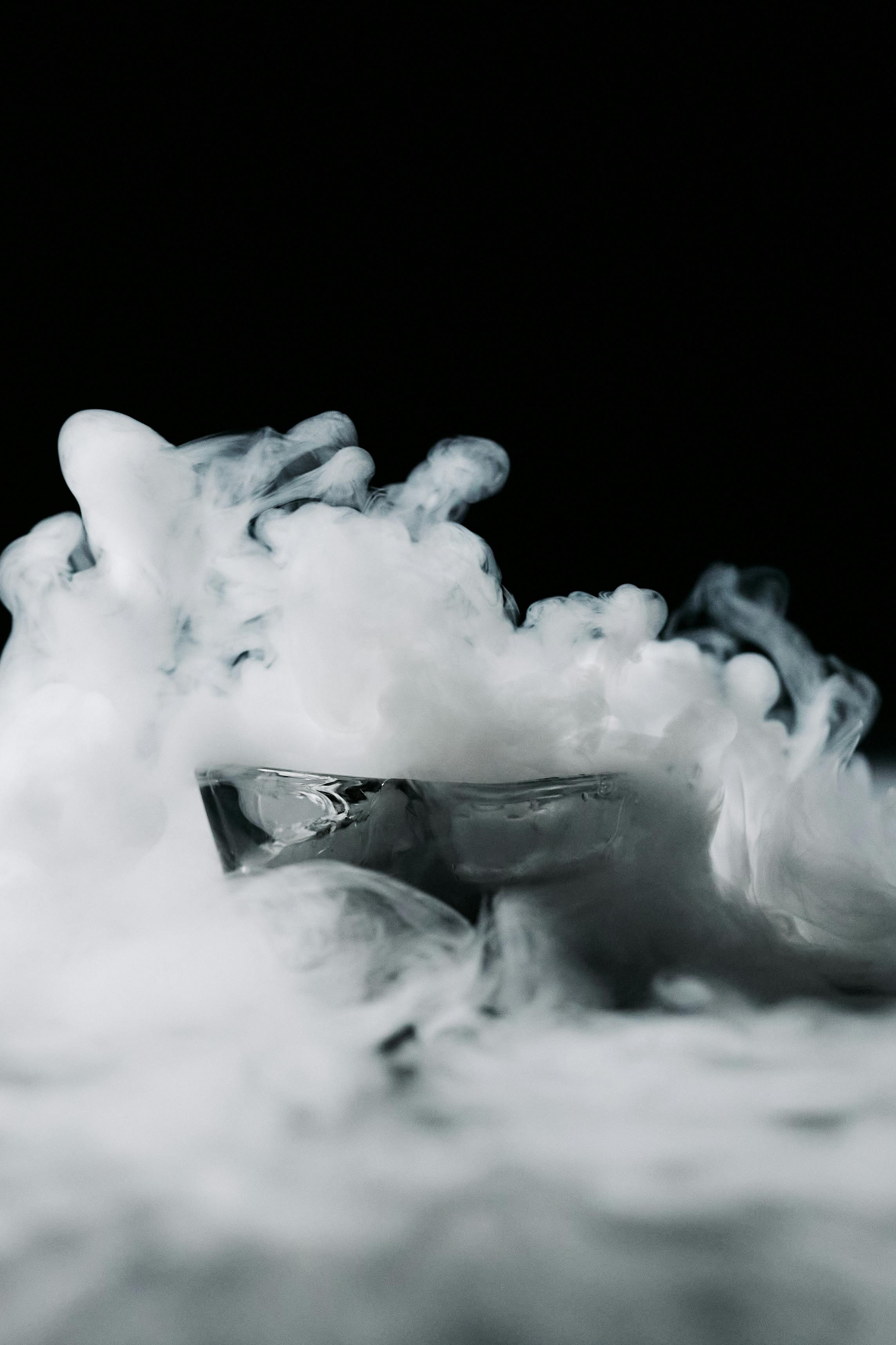 White Smoke Against Black Background · Free Stock Photo