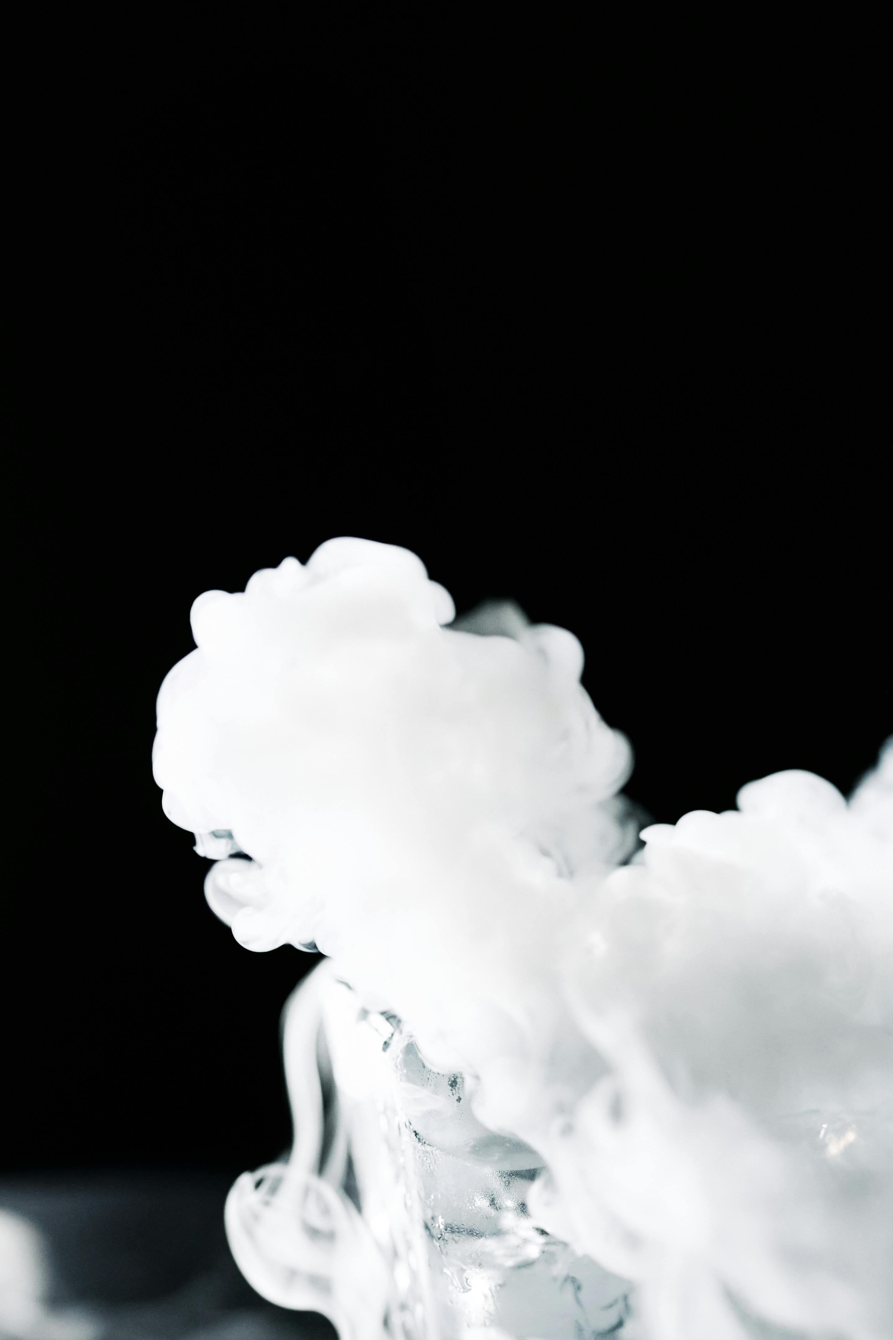 White Smoke Against Black Background · Free Stock Photo