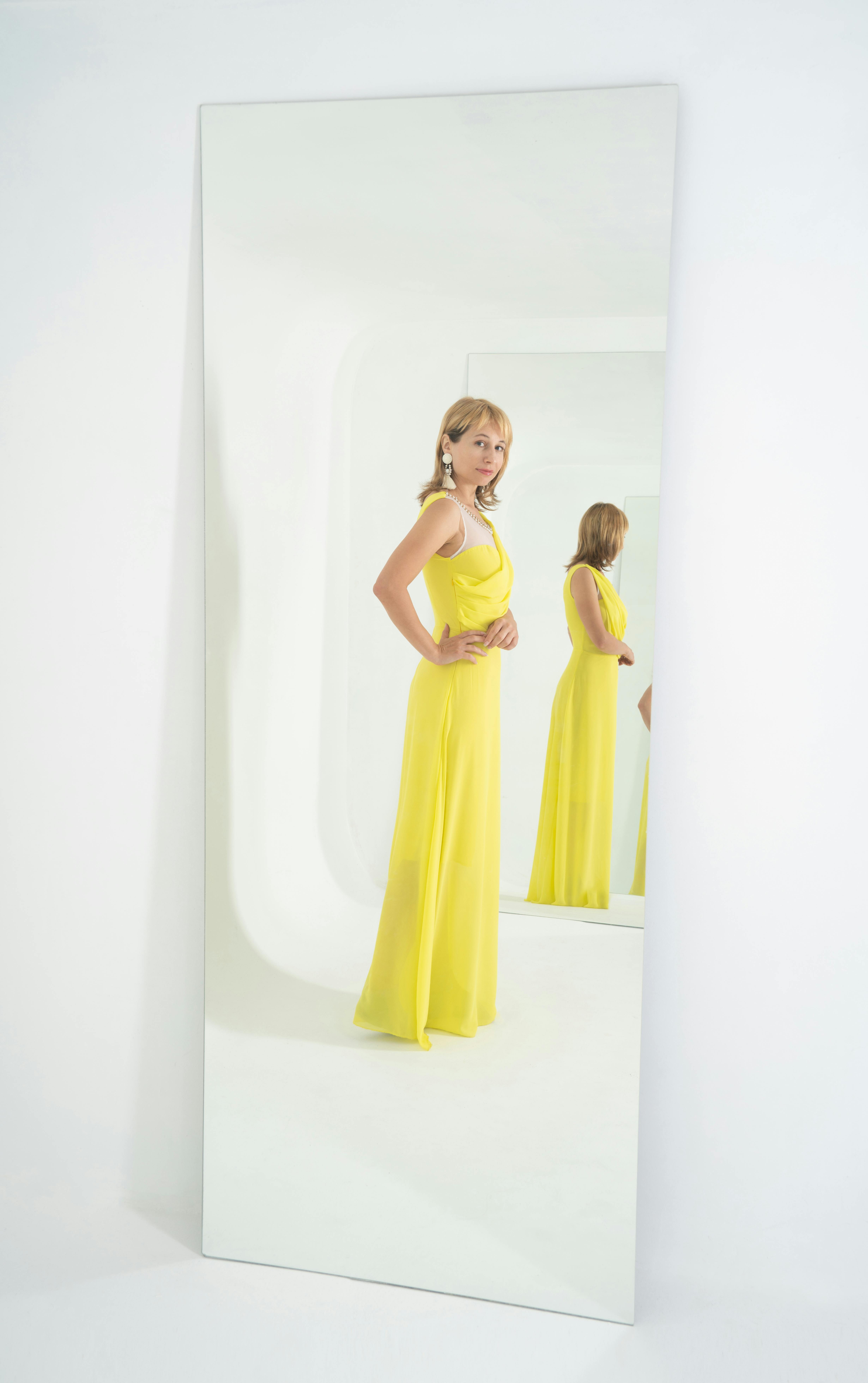 A Woman Wearing Yellow Dress · Free Stock Photo