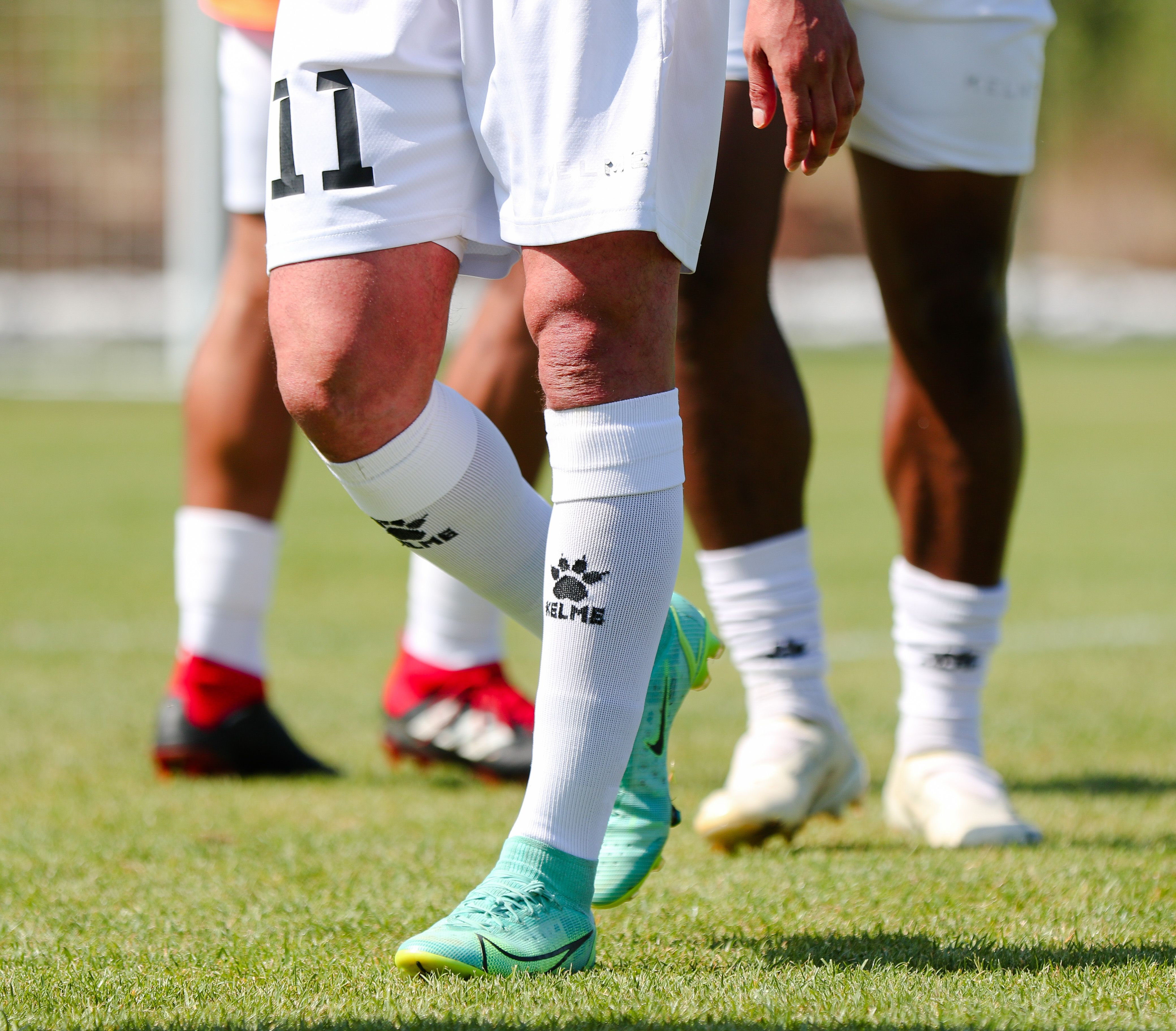 A Person Stepping on a Soccer Ball · Free Stock Photo