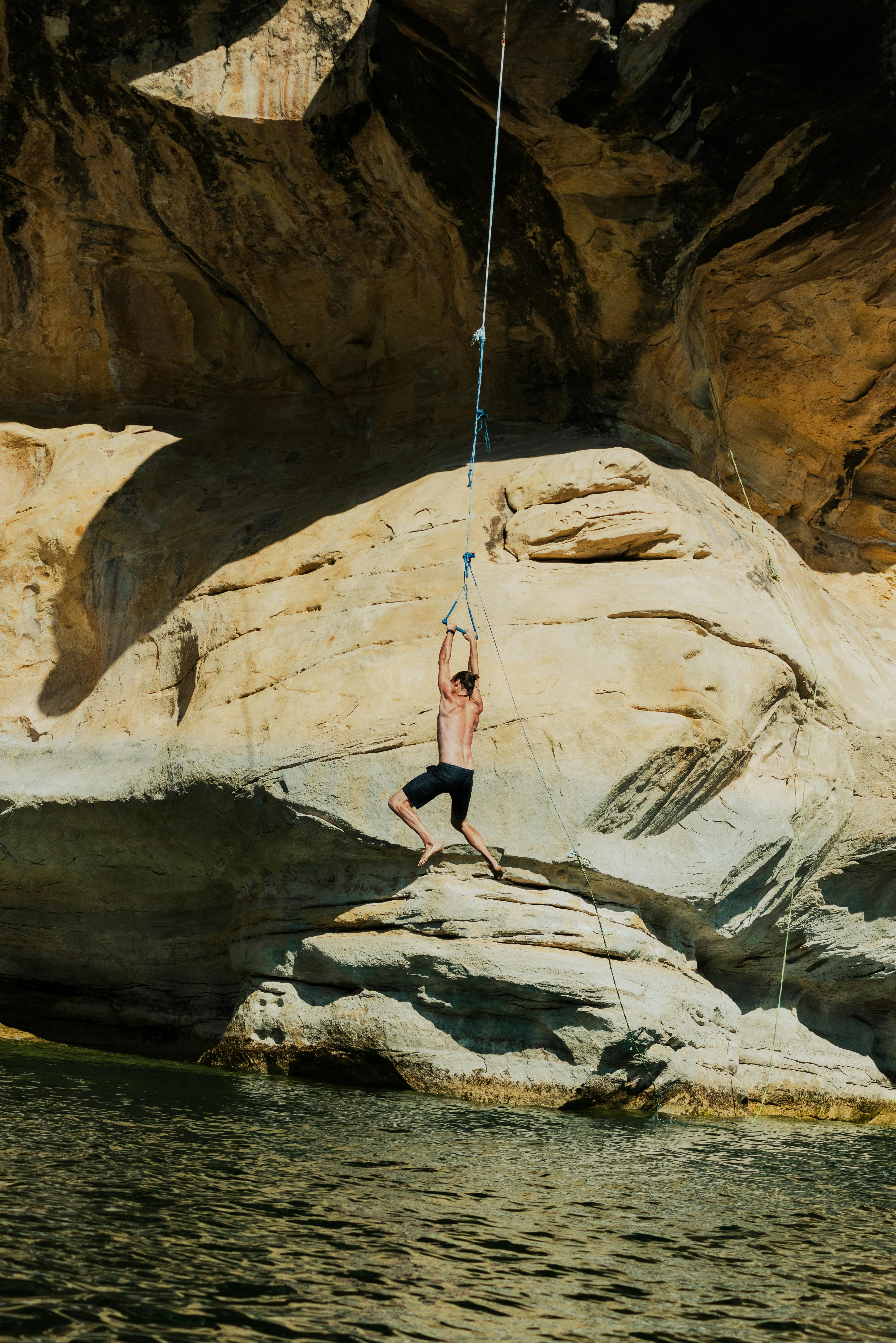 Man on Rope Bridge over Canyon · Free Stock Photo