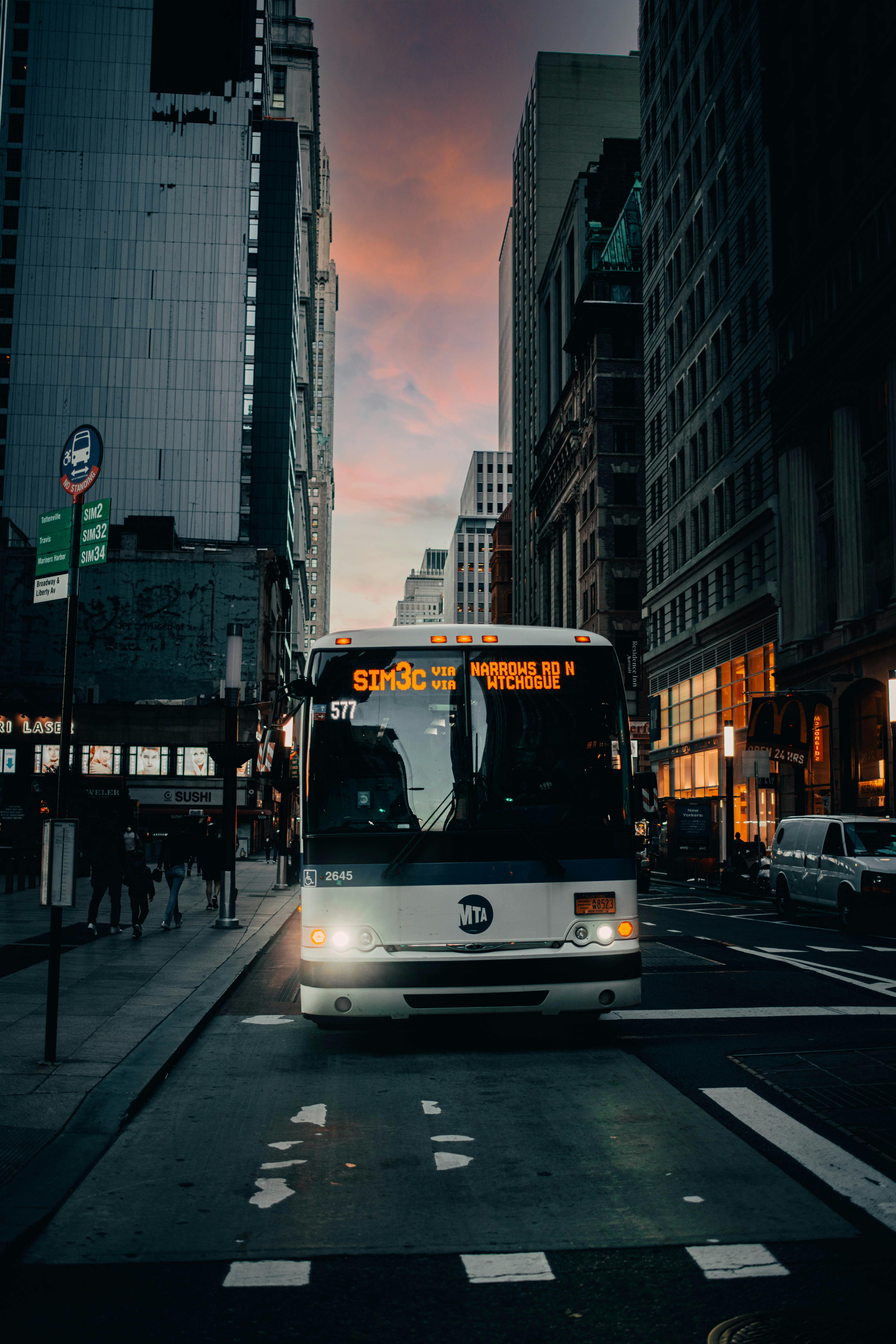 Photo of a Bus on the City Street at Dusk · Free Stock Photo