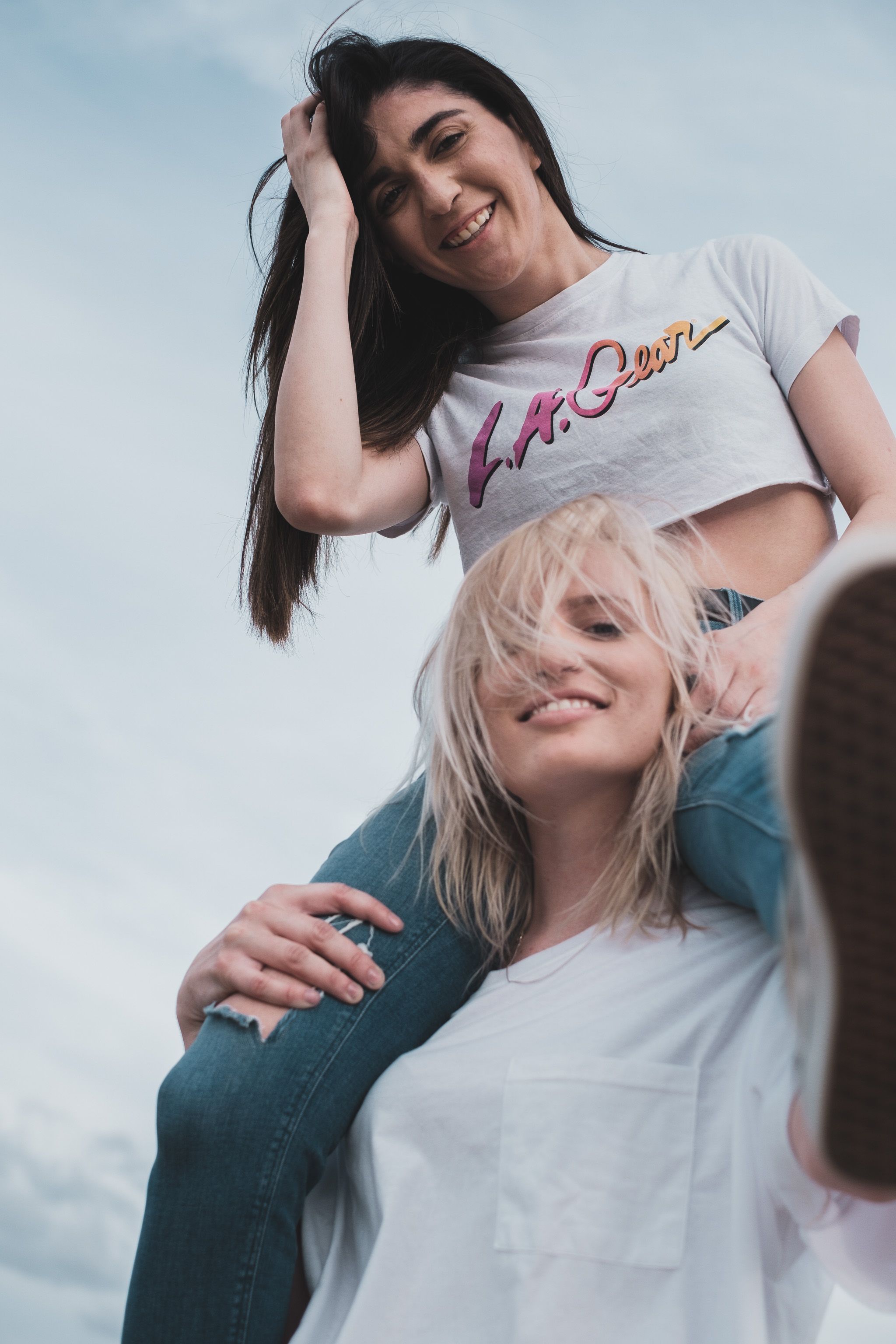 Women Hugging Each Other on Bed · Free Stock Photo
