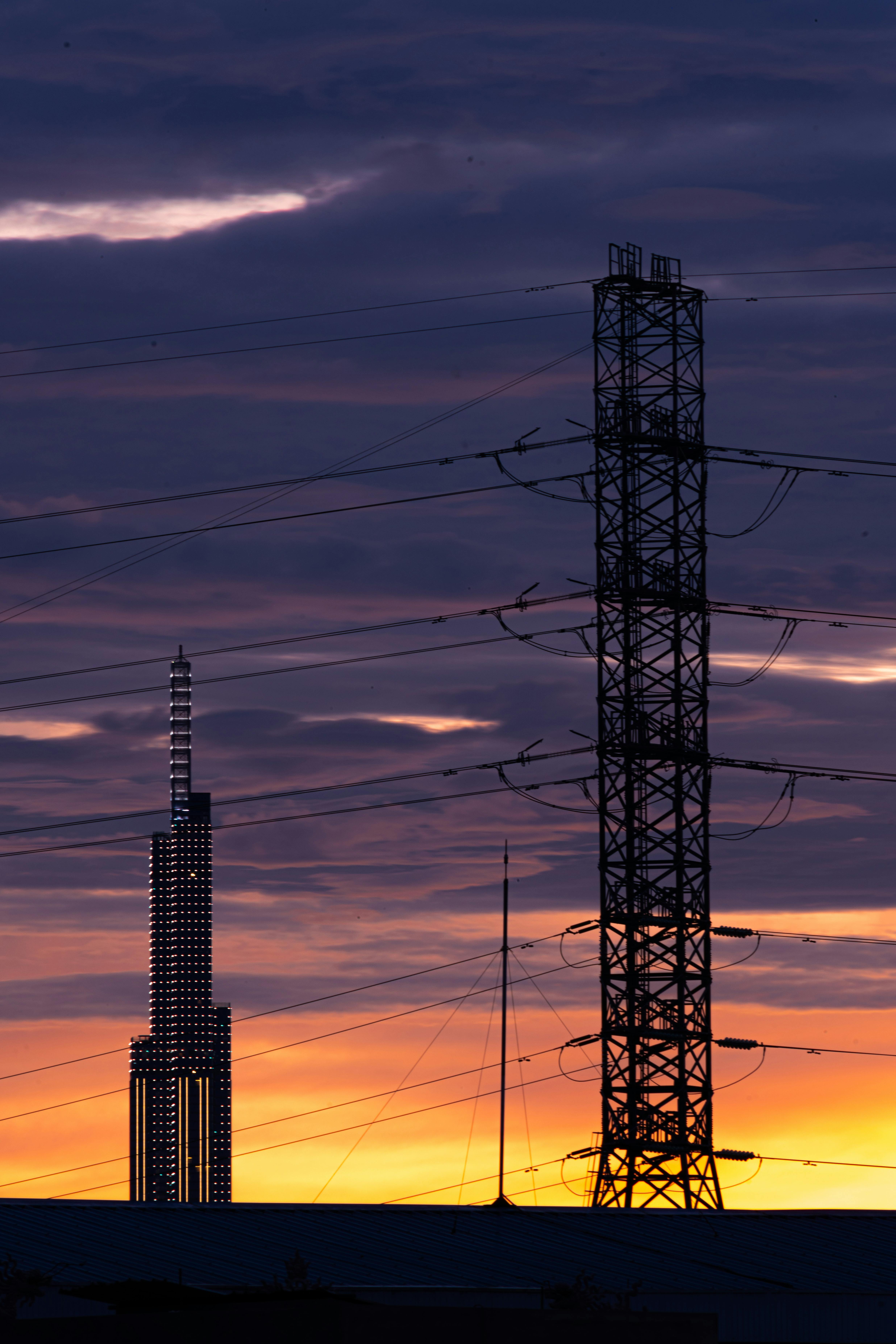 Silhouette of Electric Tower During Sunset · Free Stock Photo