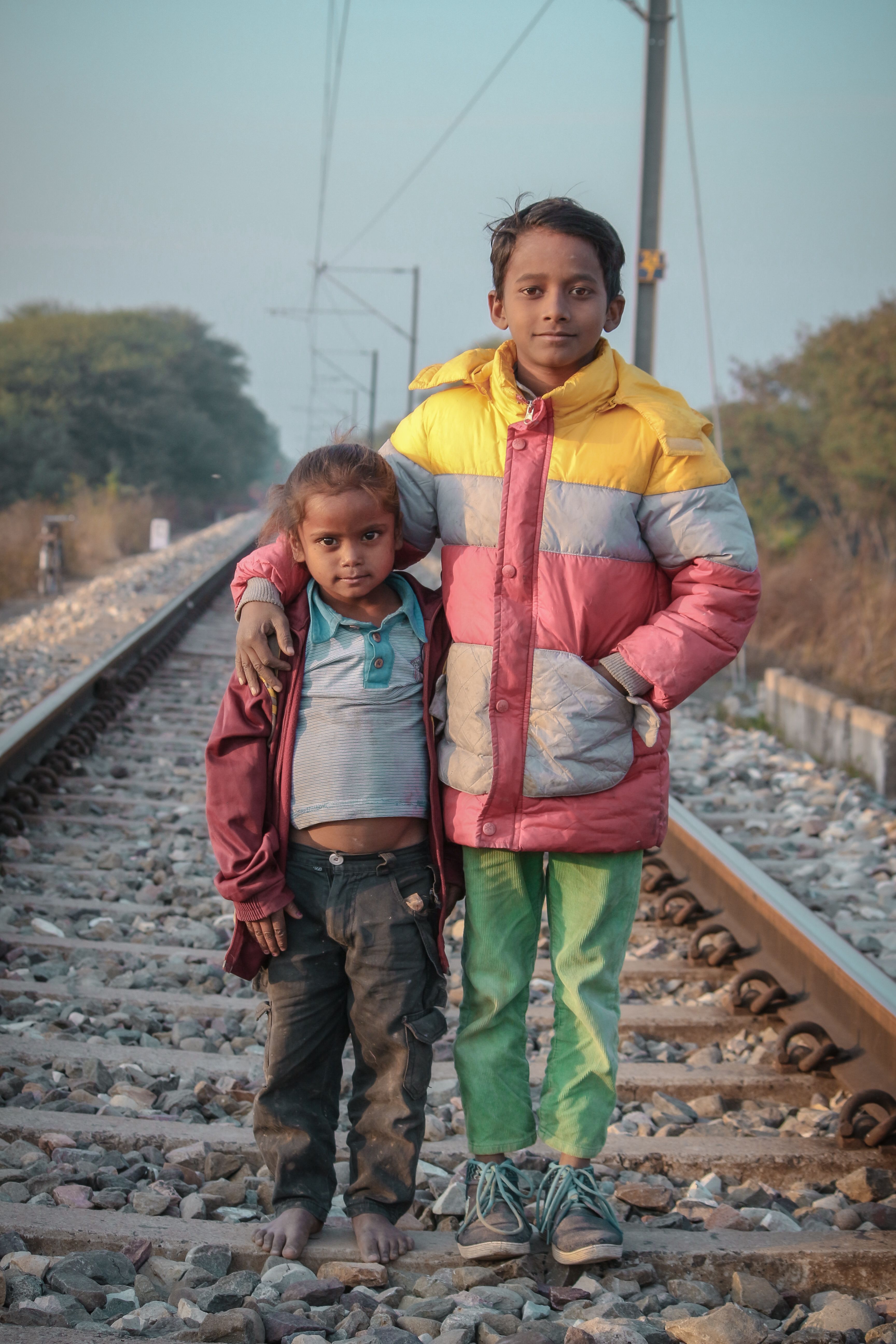 Kids Standing on Railway Track · Free Stock Photo