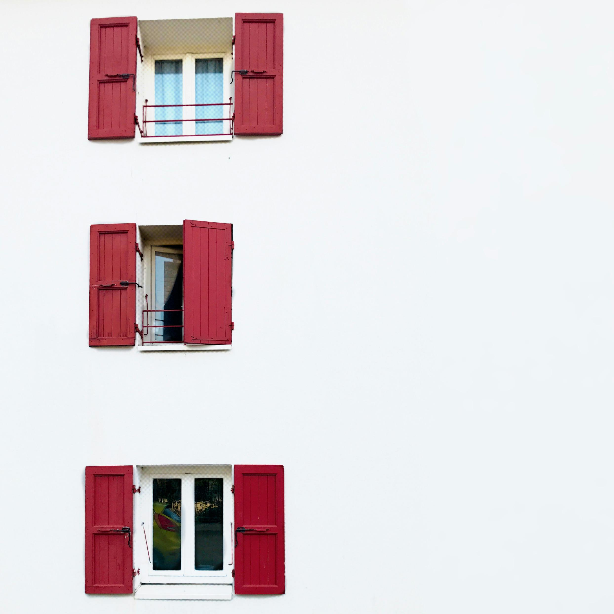 Red Wooden Window in White Concrete Wall · Free Stock Photo