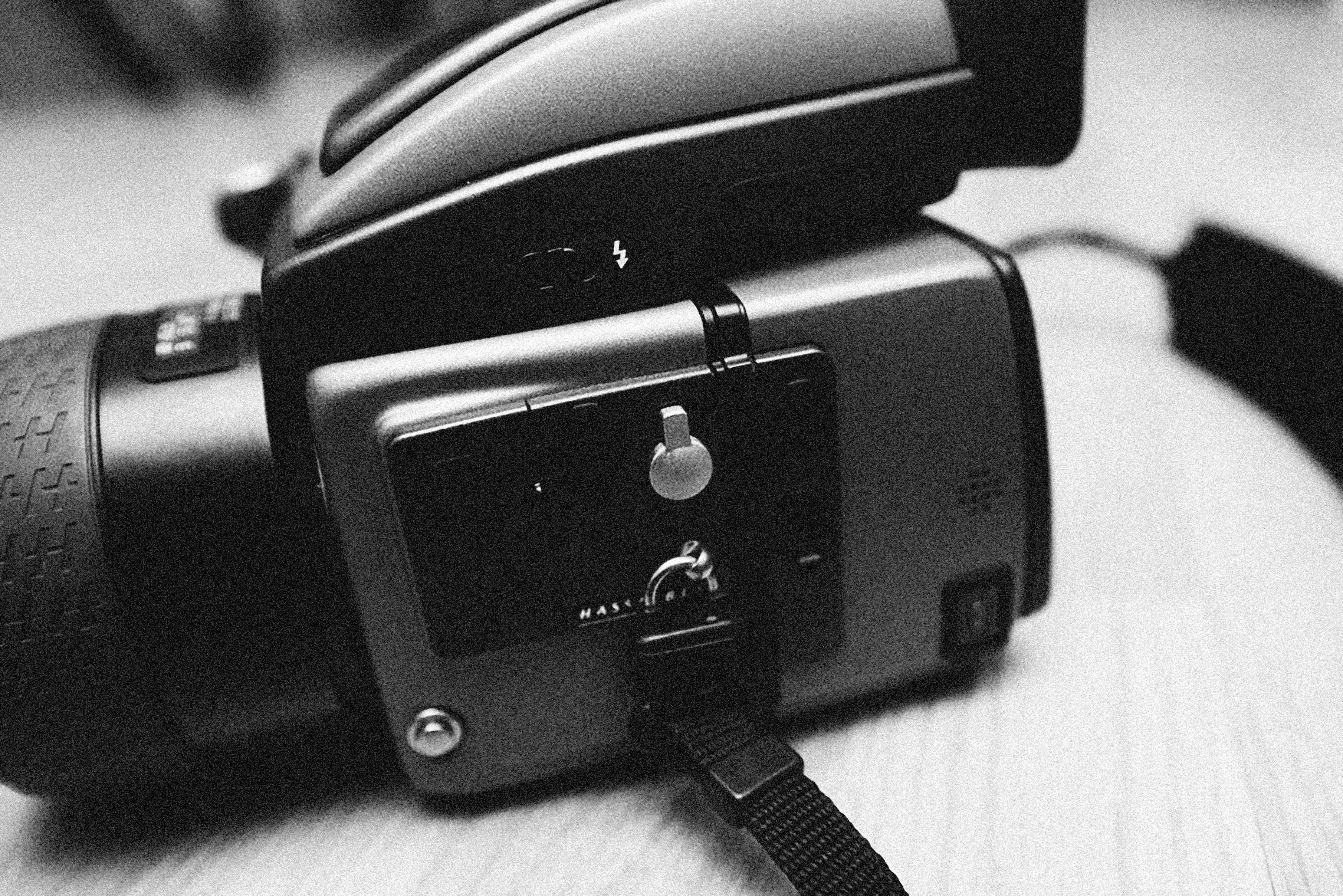 Grayscale Photo of a Camera · Free Stock Photo
