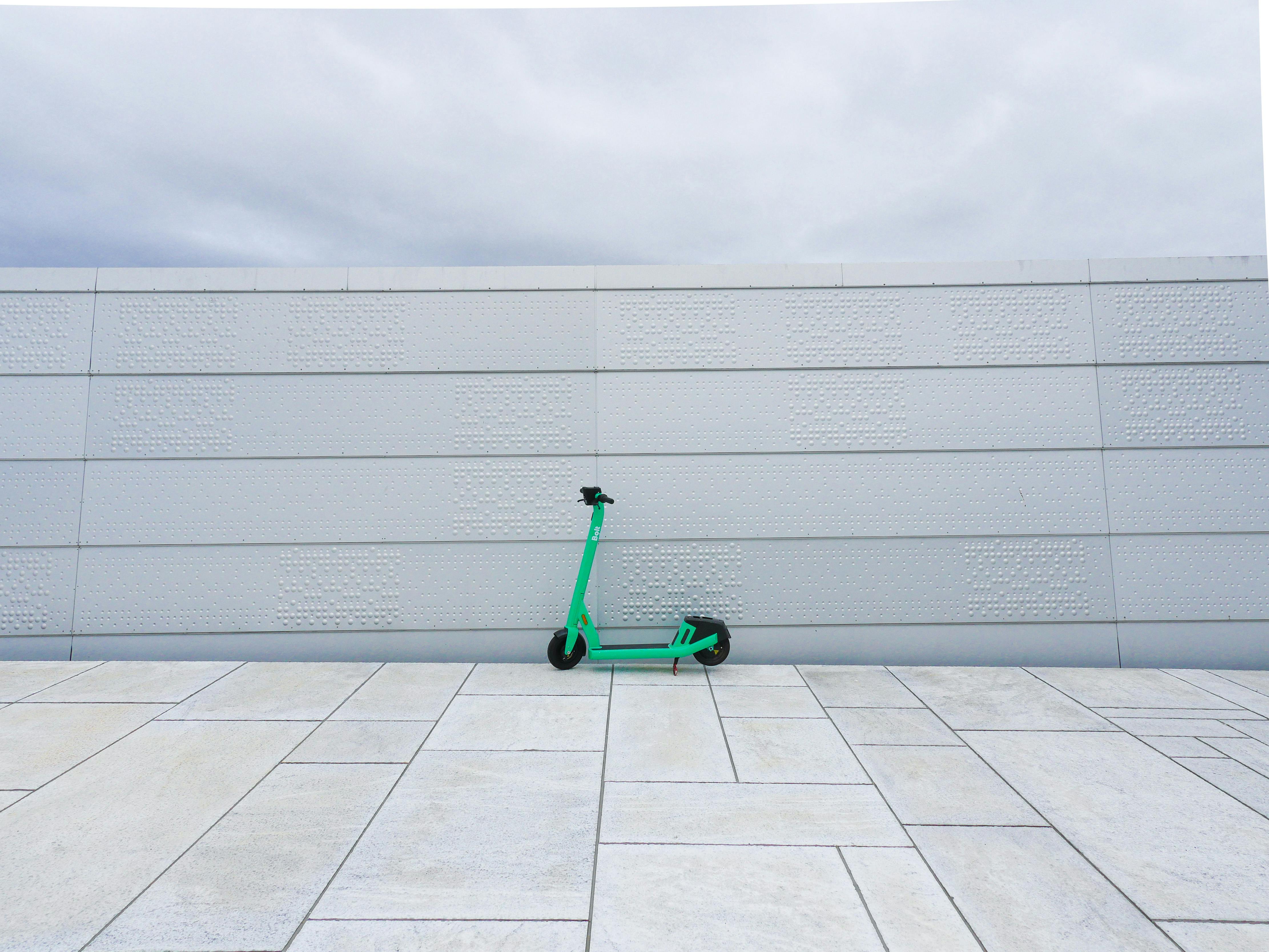 Scooter Parked on a Tiled Floor · Free Stock Photo
