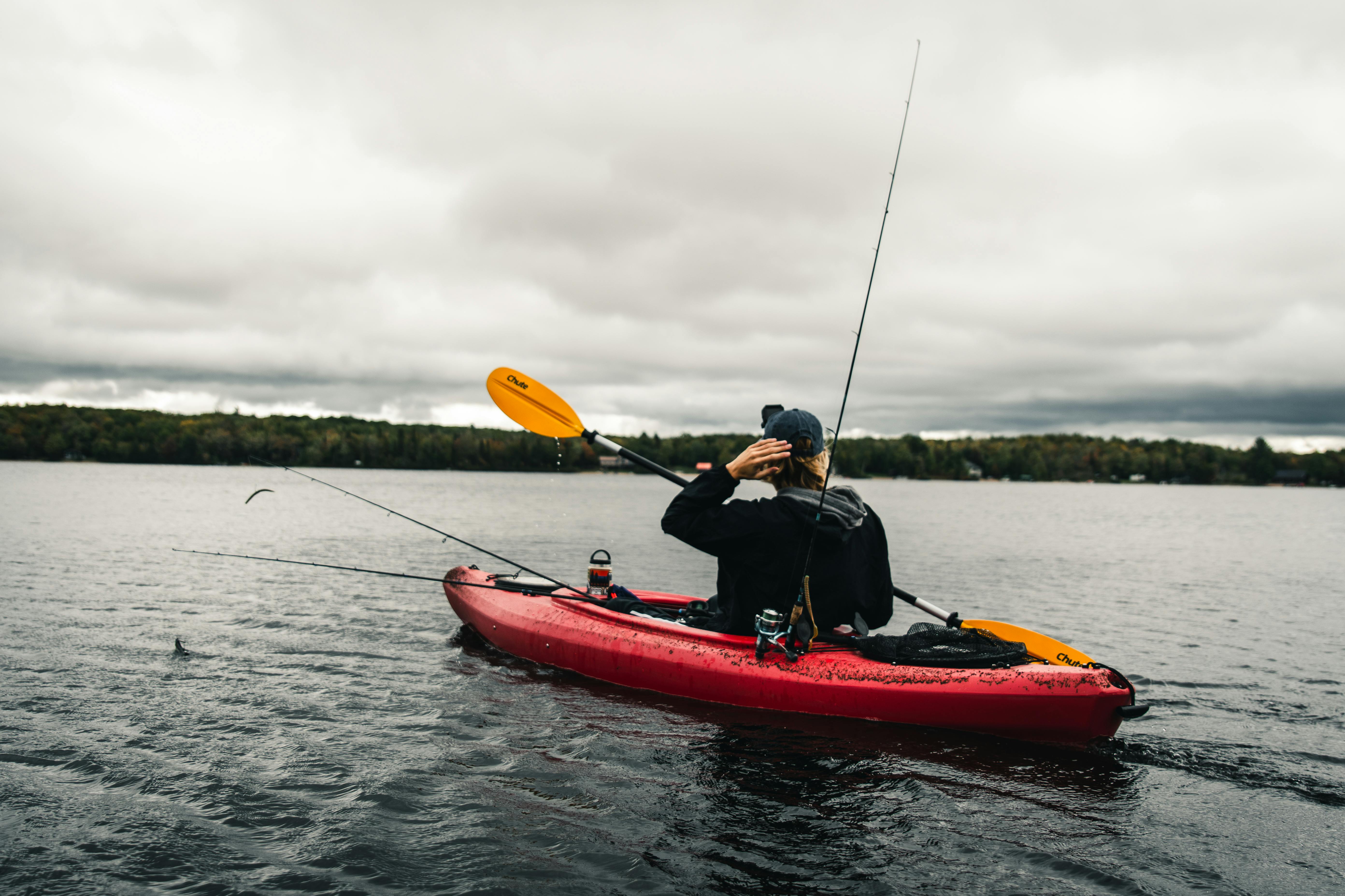 Person on Red Kayak · Free Stock Photo