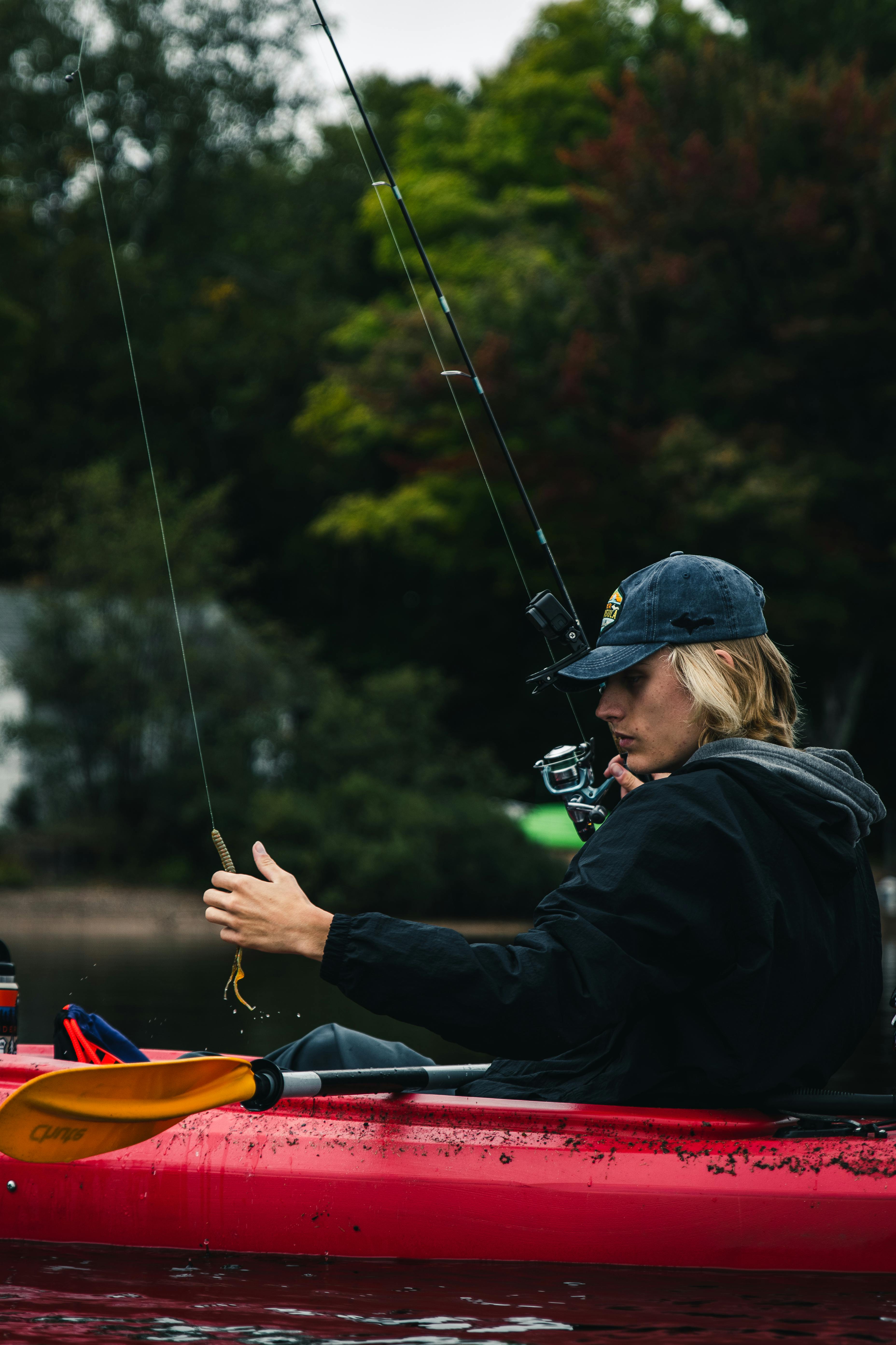 Man using Fishing Rod · Free Stock Photo