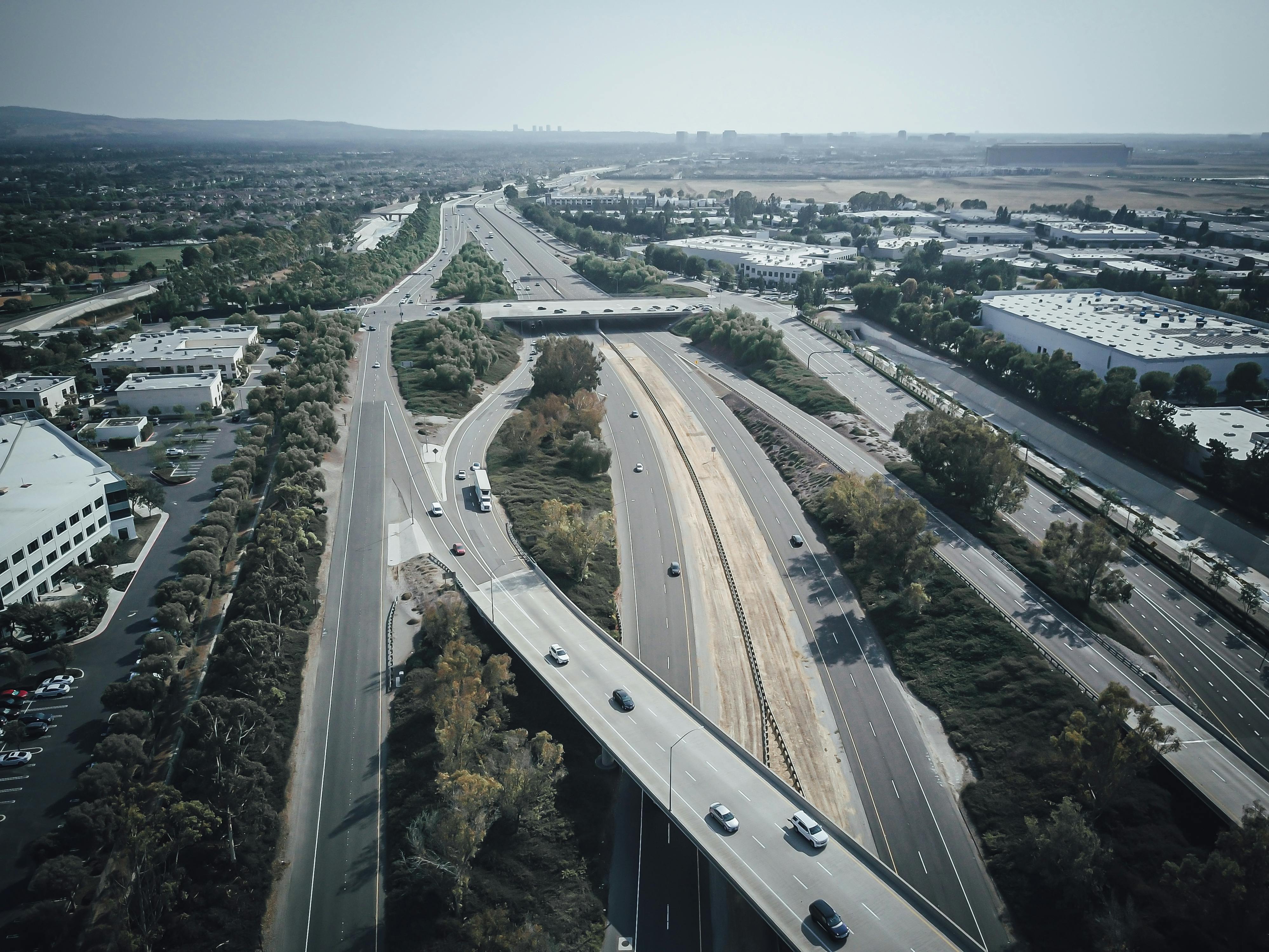 Aerial Photography of Moving Cars on an Expressway · Free Stock Photo
