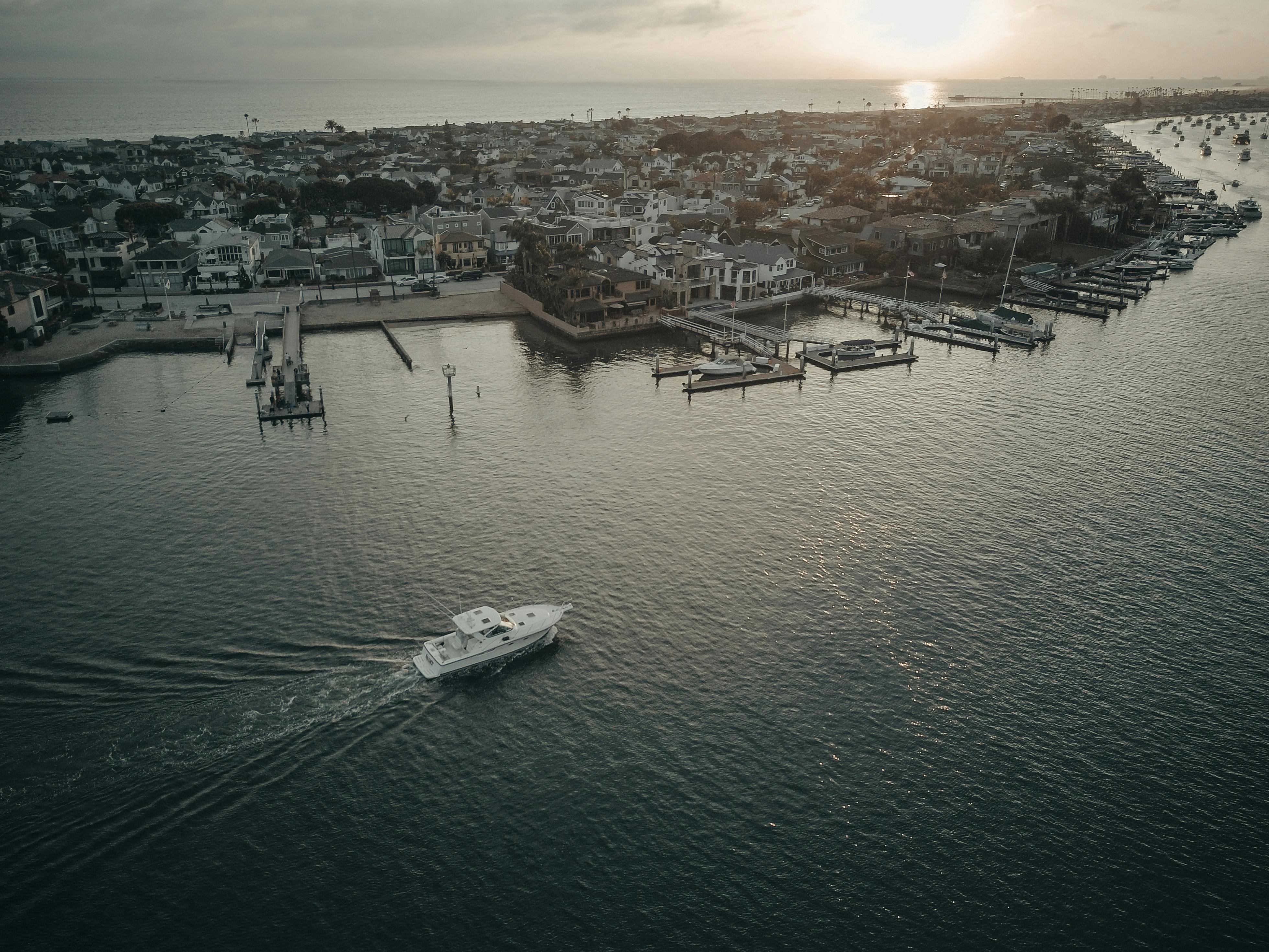 Aerial View of City Near Boating Docks at Sunset · Free Stock Photo