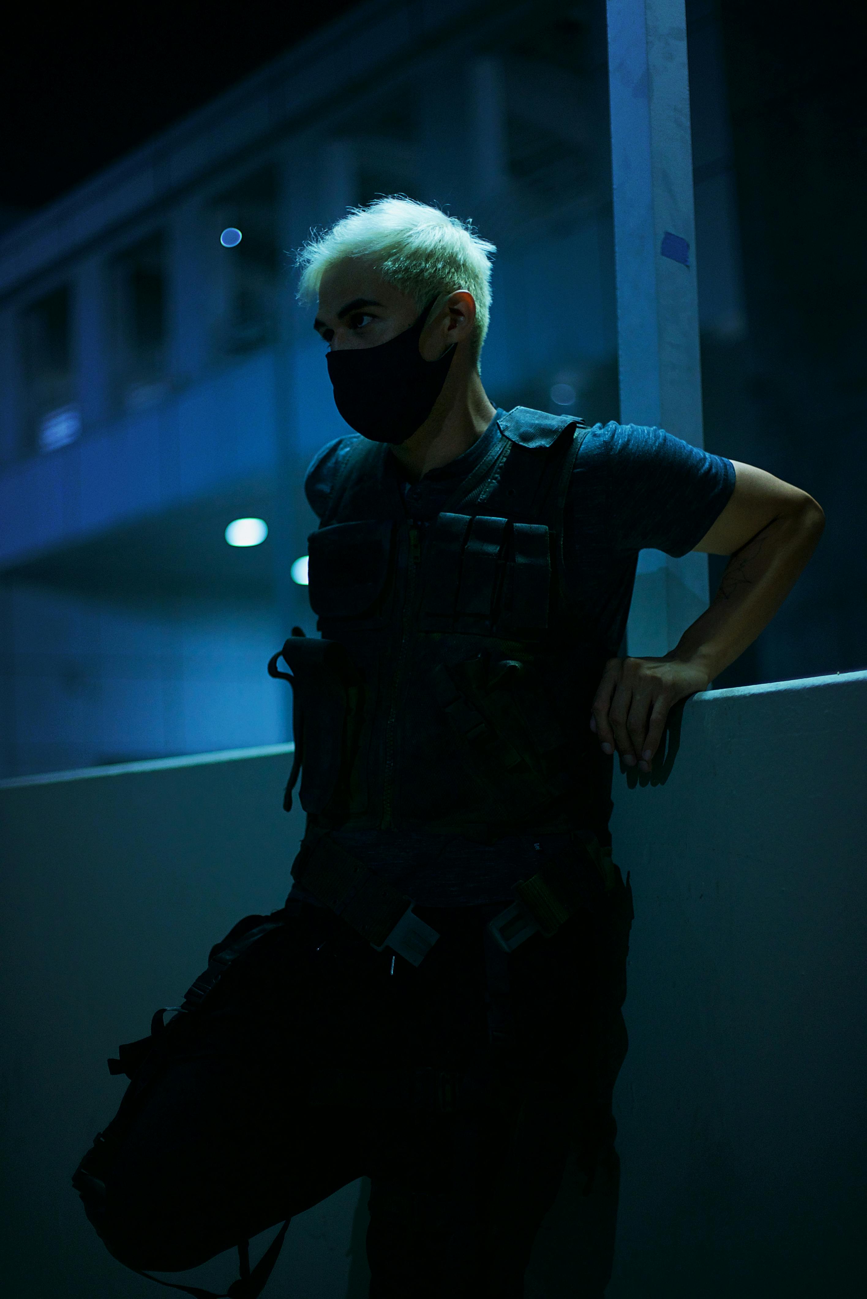 Man Standing Beside Railing · Free Stock Photo