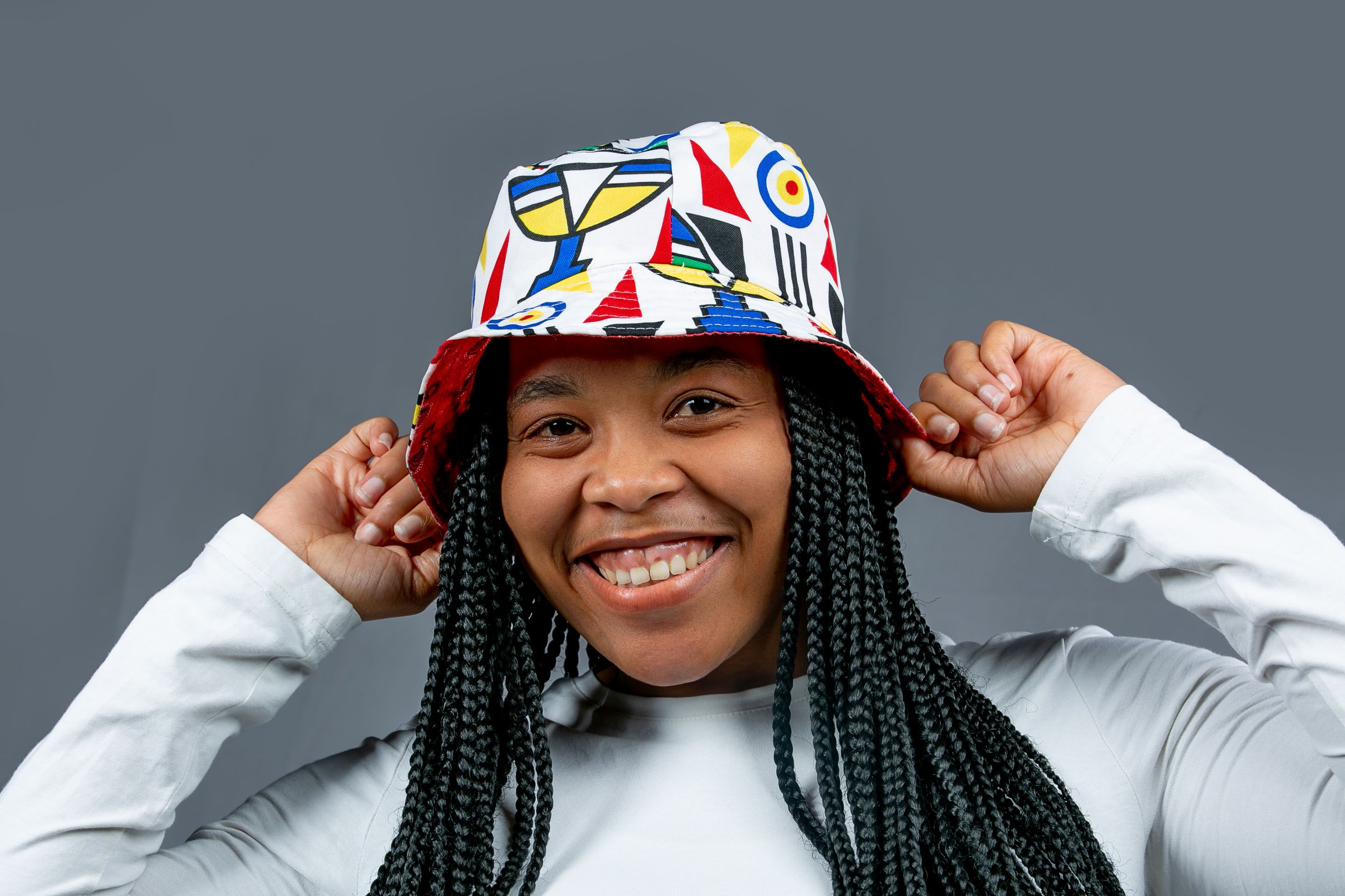 Braided Hair Woman Wearing Bucket Hat · Free Stock Photo